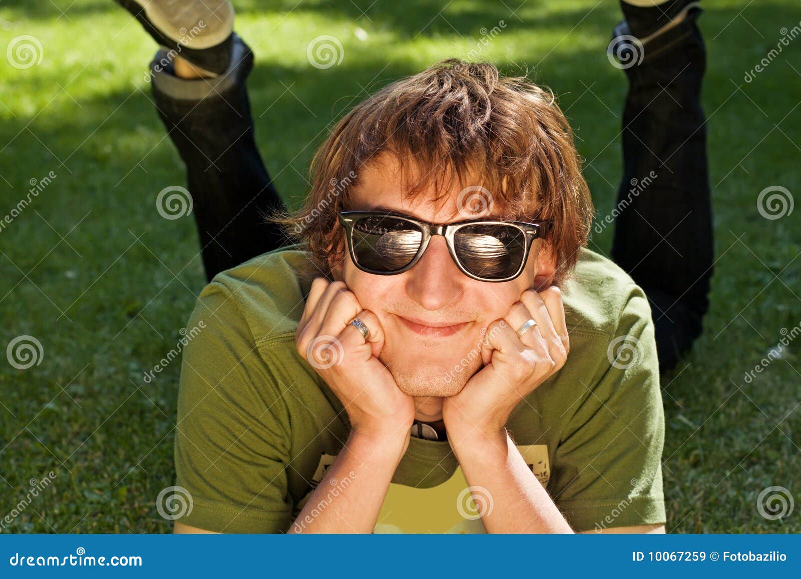 Happy guy stock image. Image of portrait, young, grass - 10067259