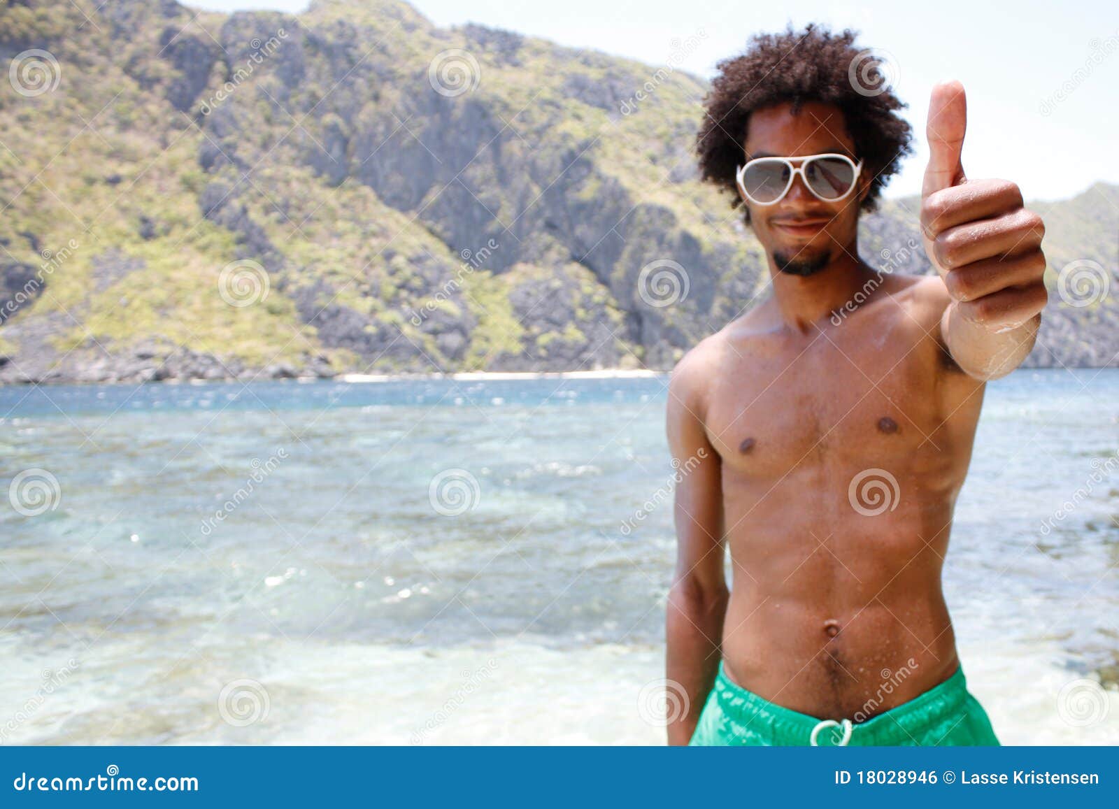 Happy guy on the beach stock photo. Image of afro, sunglasses - 18028946