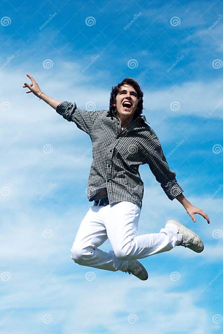 Happy guy jumping stock image. Image of lucky, bounce - 12331339