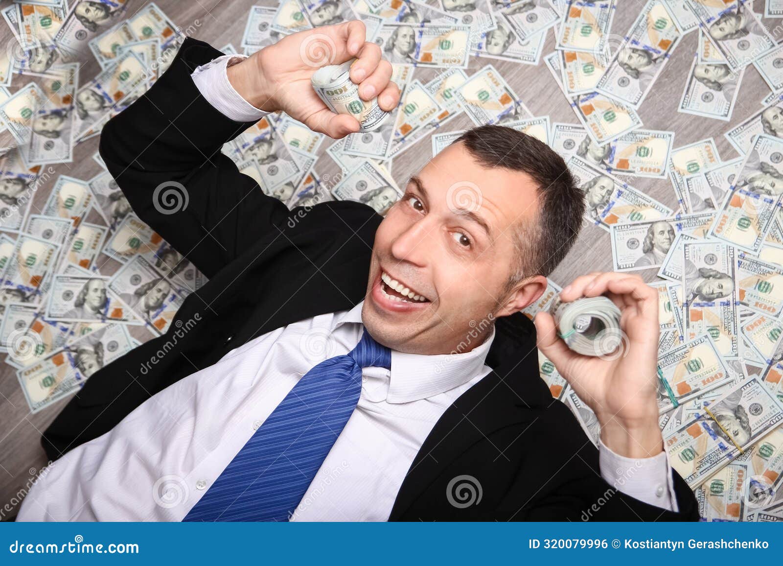 A Happy Guy with Money in His Hands for the Development of Shopping ...