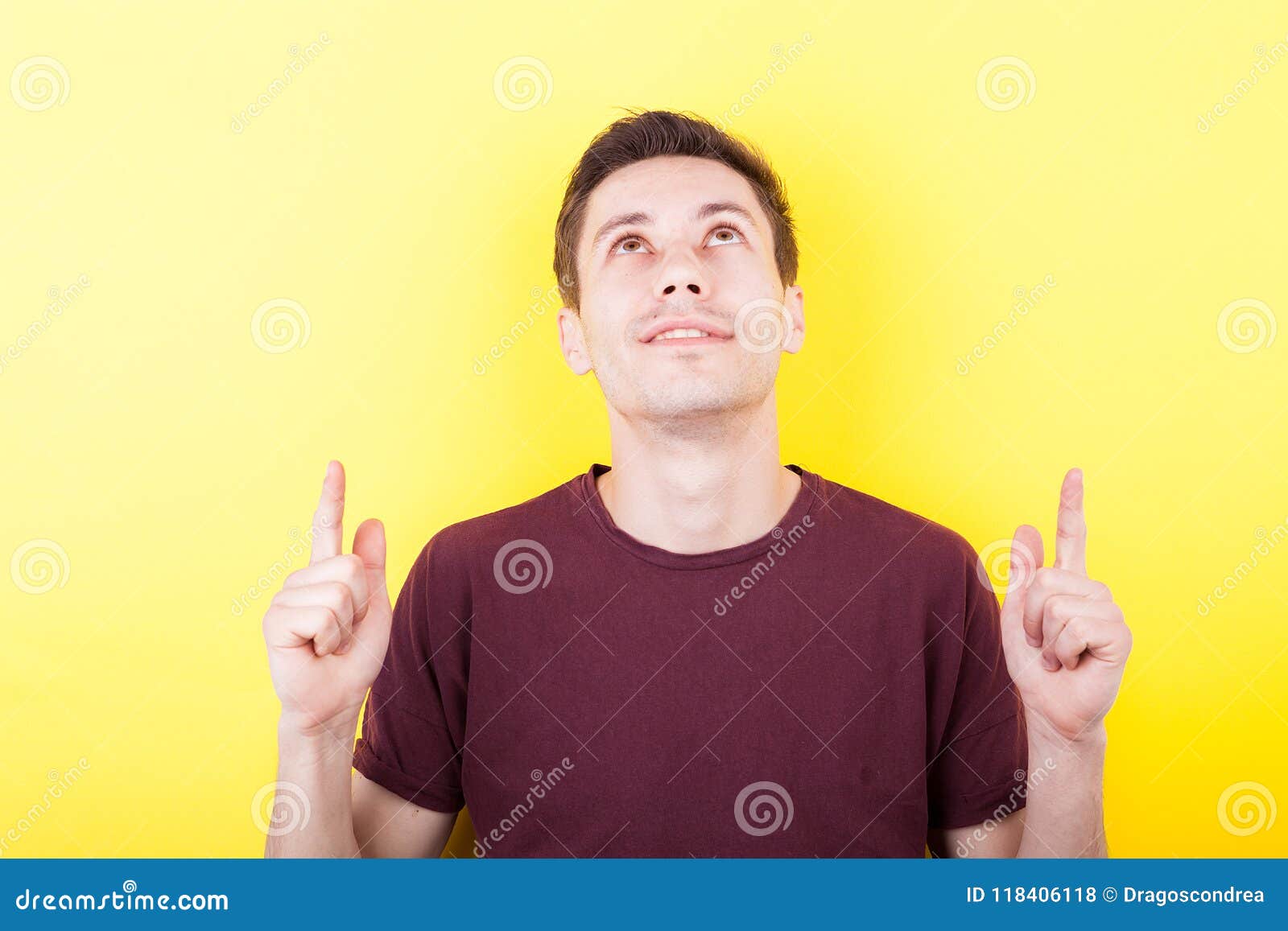 Happy Guy Pointing Up on Yellow Background Stock Photo - Image of good ...