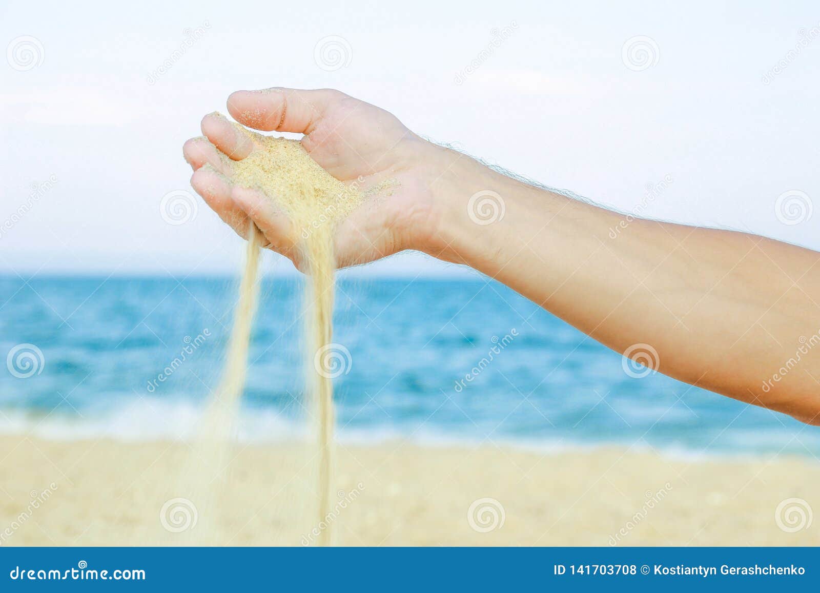 Happy Guy Pours Sand from the Sea of Hands Stock Photo - Image of ...