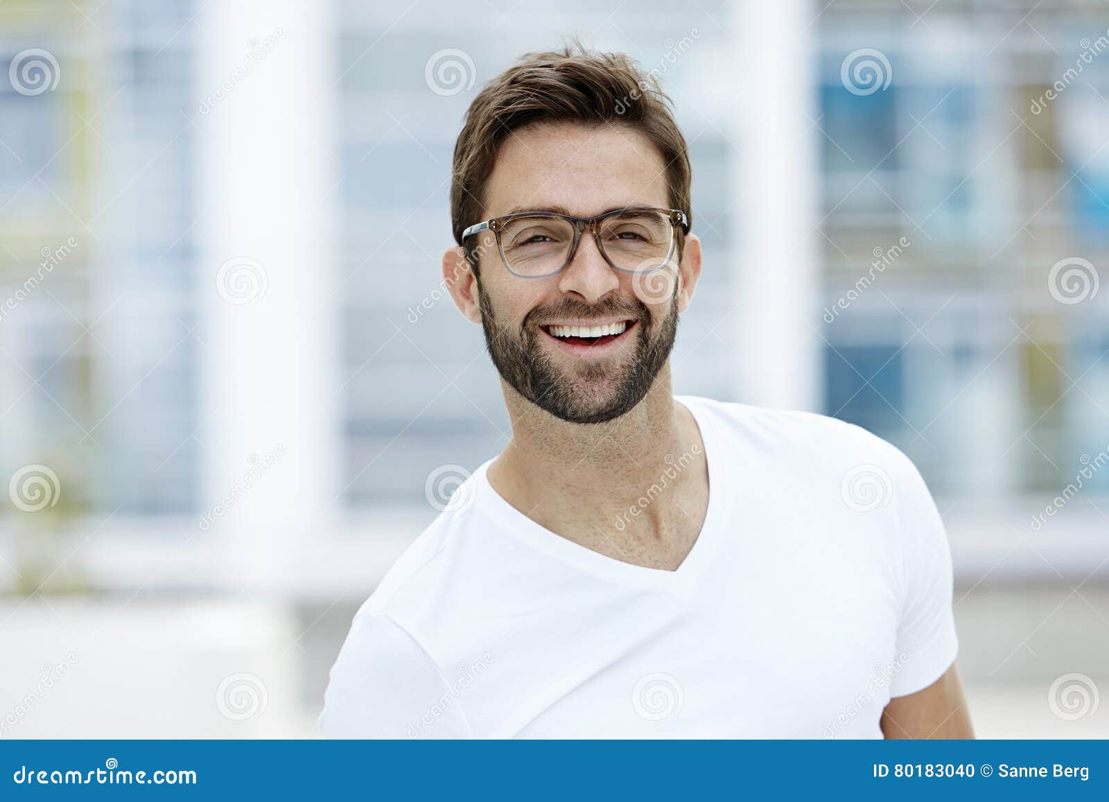 Happy guy in spectacles stock photo. Image of years, beard - 80183040