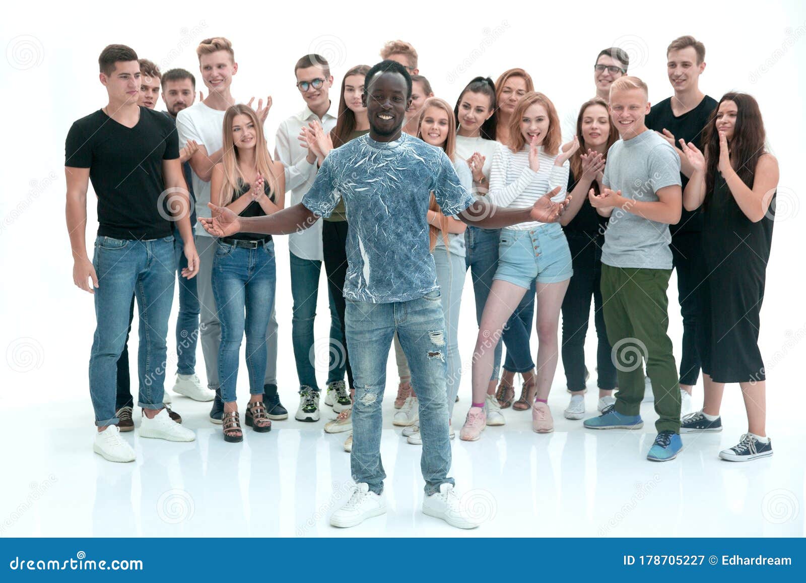 Happy Guy Standing in Front of His Friends Team Stock Image - Image of ...