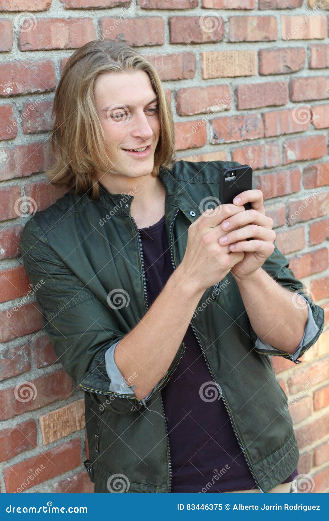 Happy Guy Using a Smart Phone Outside Stock Image - Image of social ...