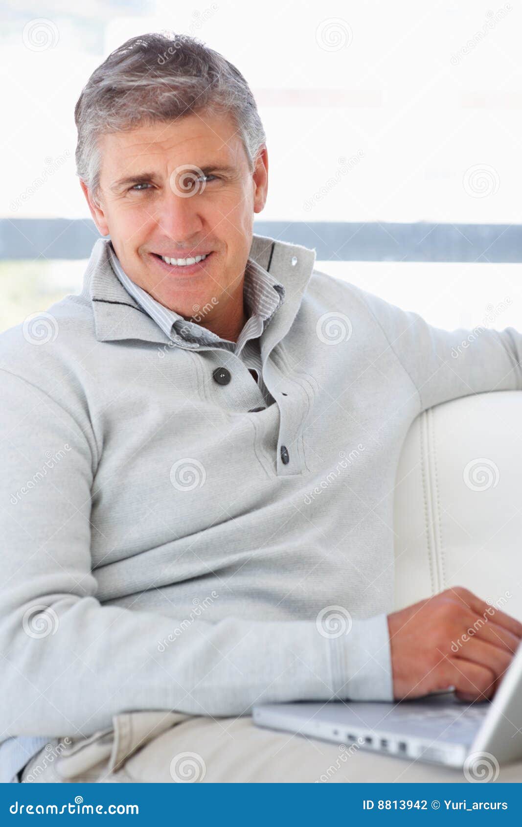 Happy Handsome Business Man Working on a Laptop Stock Photo - Image of ... Happy Handsome Business Man Working on a Laptop Stock Photo - Image of ...