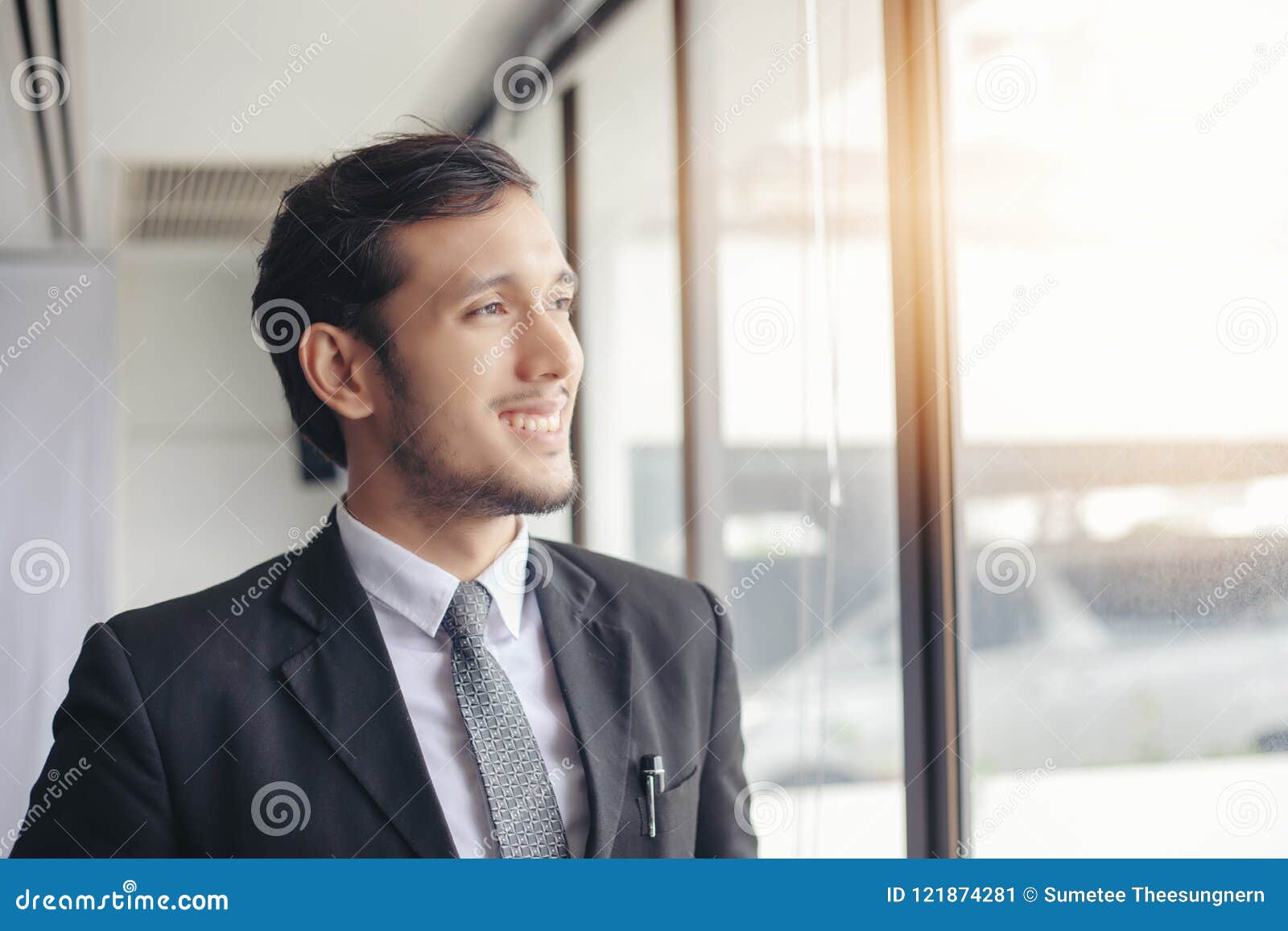 Happy Handsome Businessman Standing and Smiling in Office Stock Image ... Happy Handsome Businessman Standing and Smiling in Office Stock Image ...