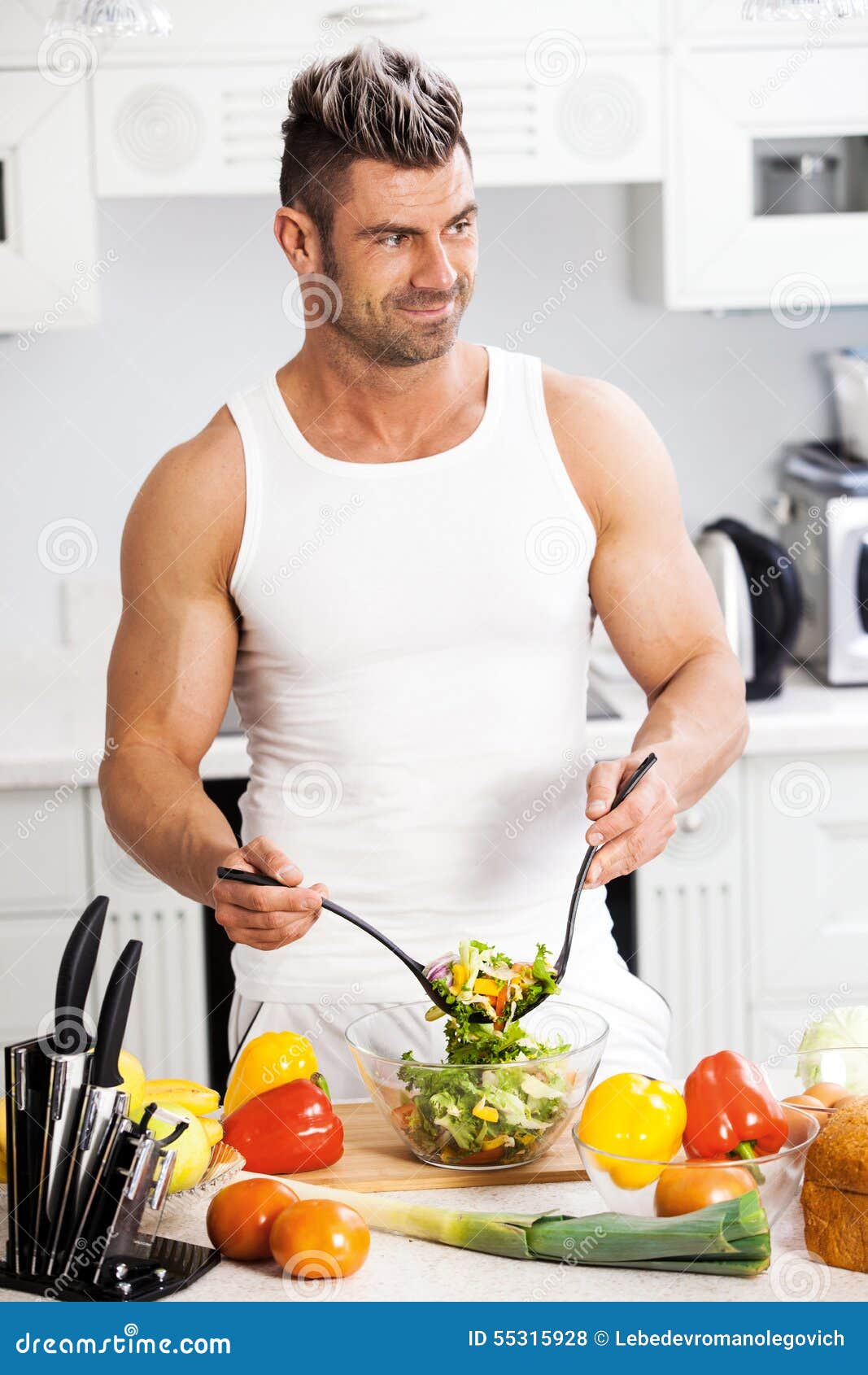 Happy Handsome Man Cooking in Kitchen at Home. Stock Photo - Image of ...