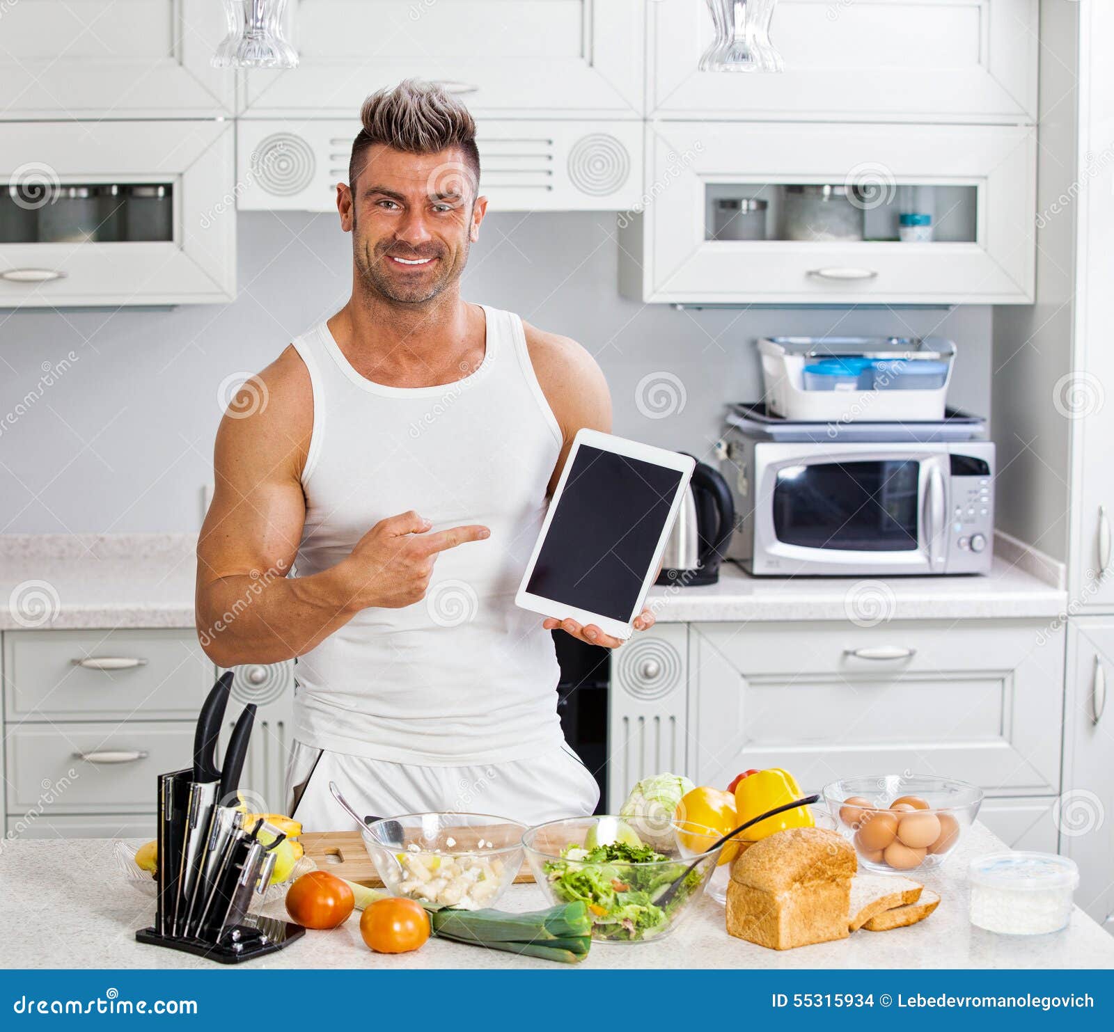 Happy Handsome Man Cooking in Kitchen at Home. Stock Photo - Image of ...