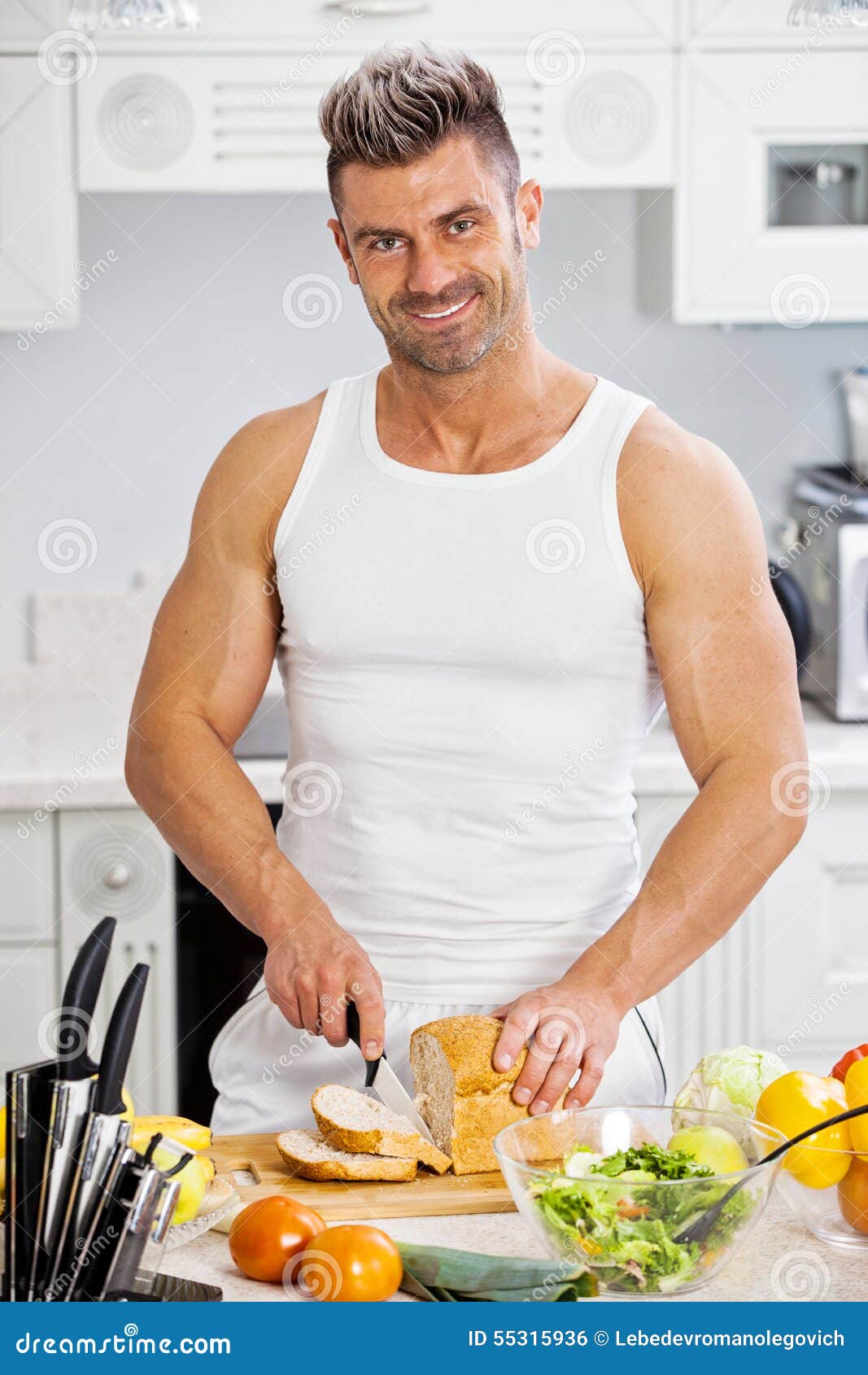 Happy Handsome Man Cooking in Kitchen at Home. Stock Photo - Image of ...