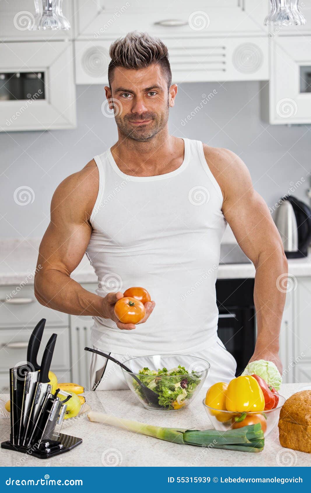 Happy Handsome Man Cooking in Kitchen at Home. Stock Image - Image of ...