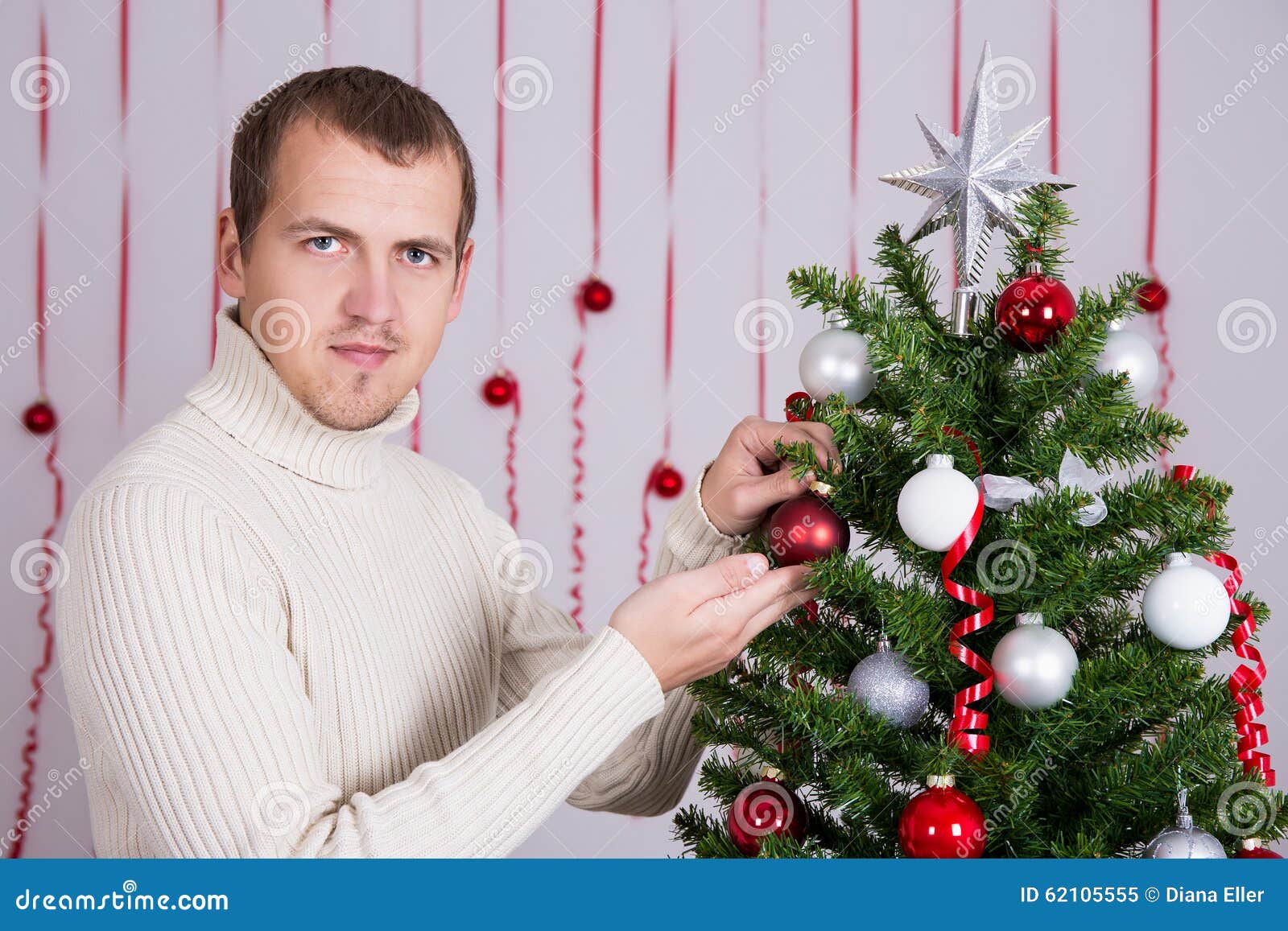 Happy Handsome Man Decorating Christmas Tree Stock Image - Image of ...