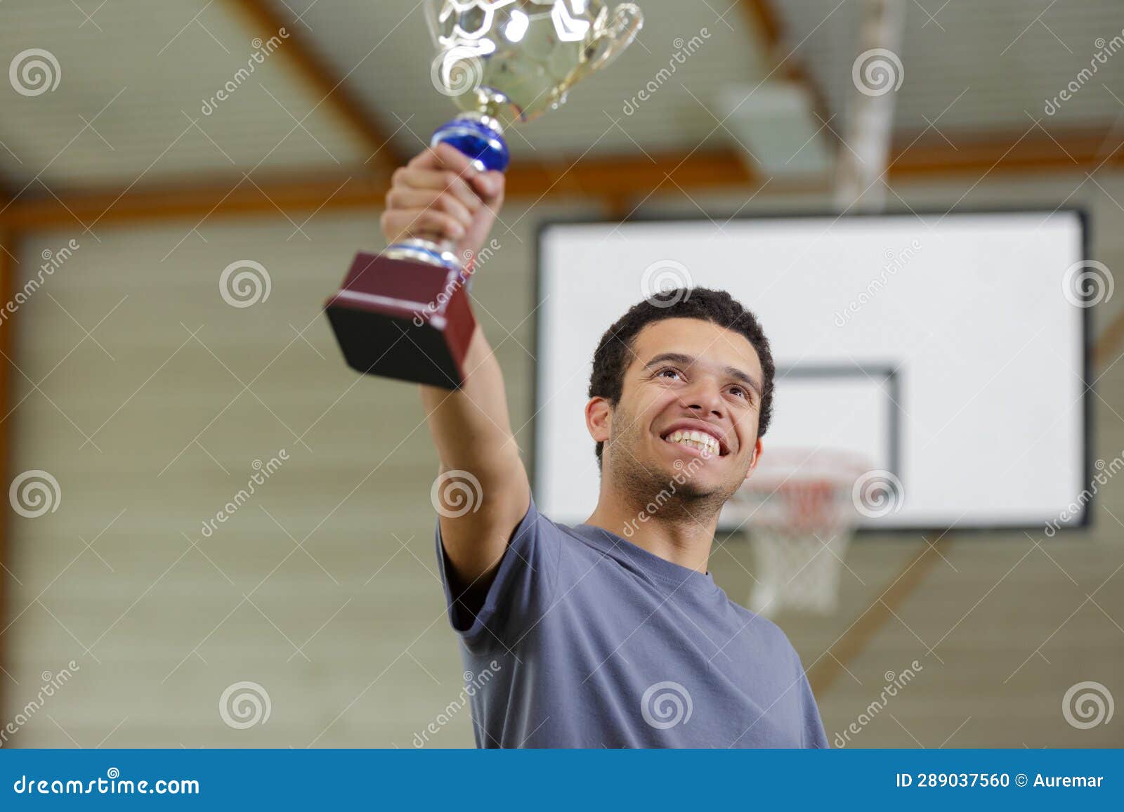 Happy Handsome Man Holding Trophy Stock Photo - Image of happiness ...