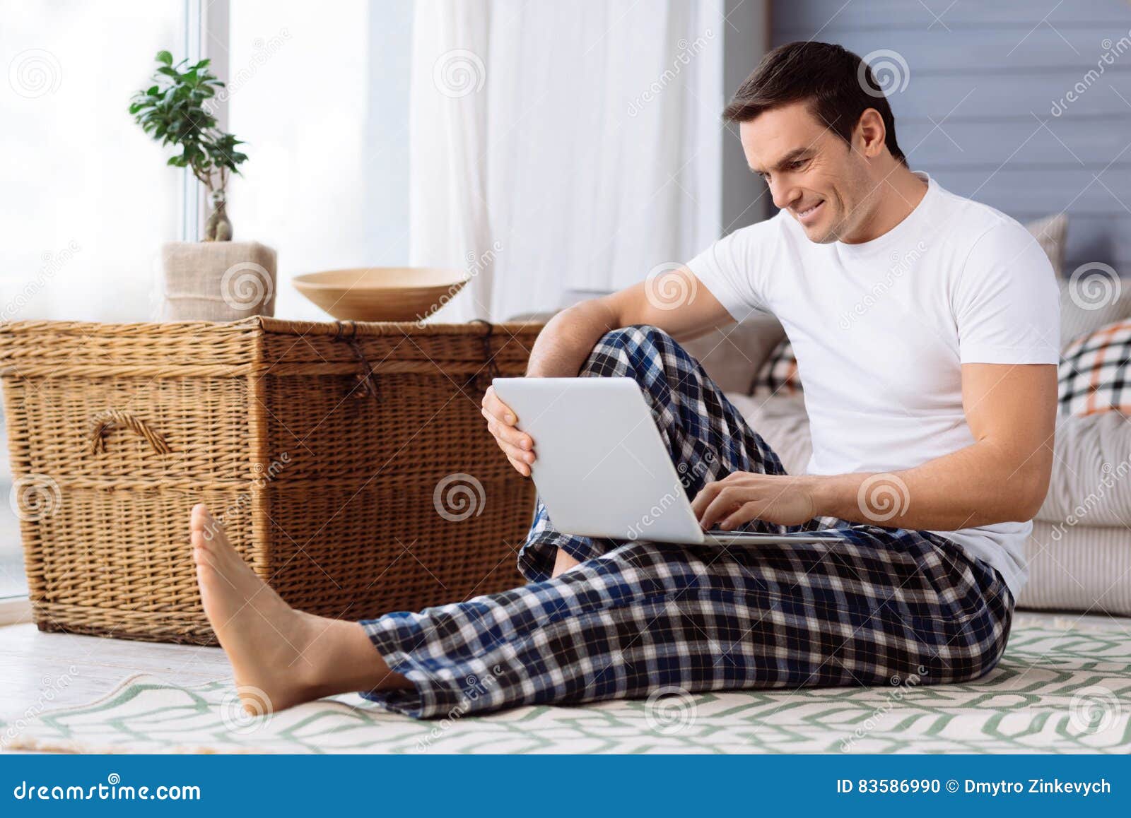 Happy Handsome Man Looking at the Laptop Screen Stock Photo - Image of ...