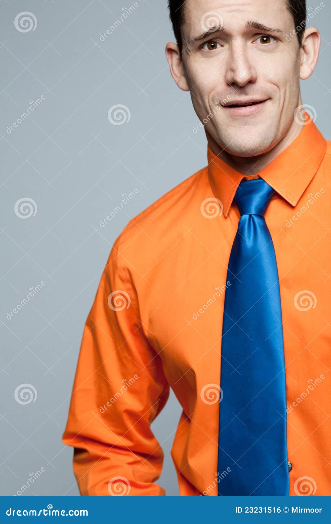 Happy Handsome Man in Orange Shirt. Stock Photo - Image of casual ...