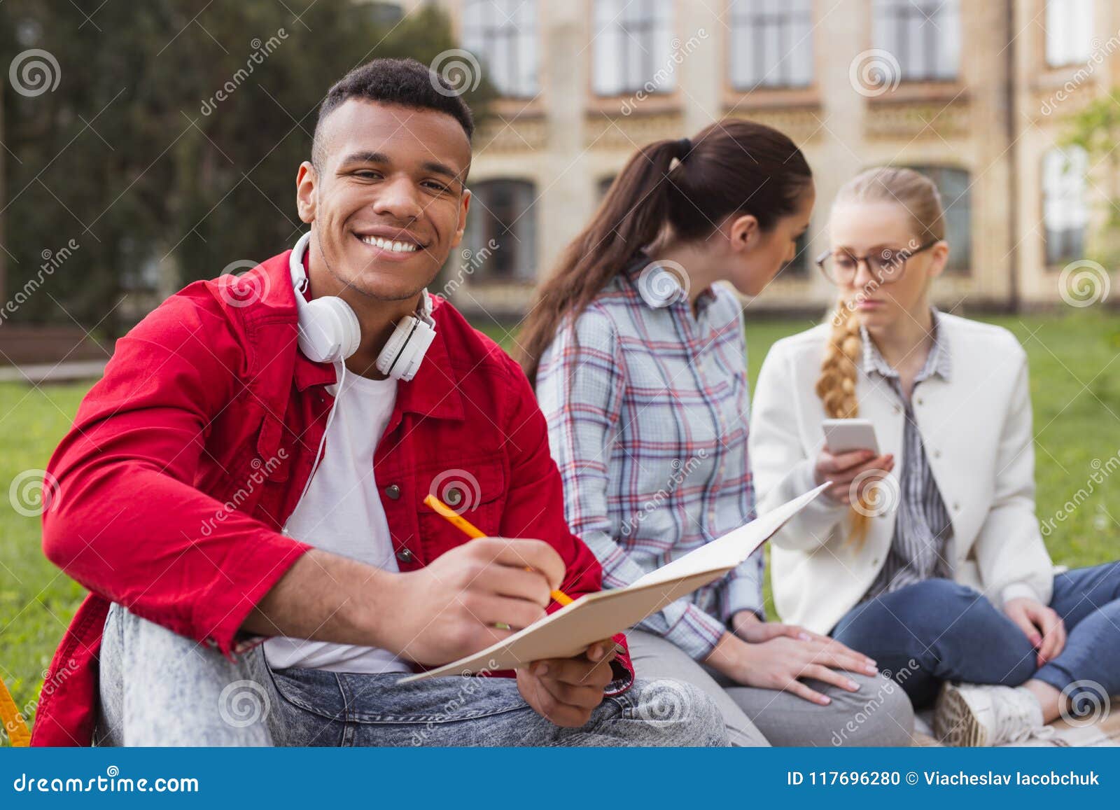 Happy Handsome Student Writing Notes in His Planner Stock Photo - Image ...