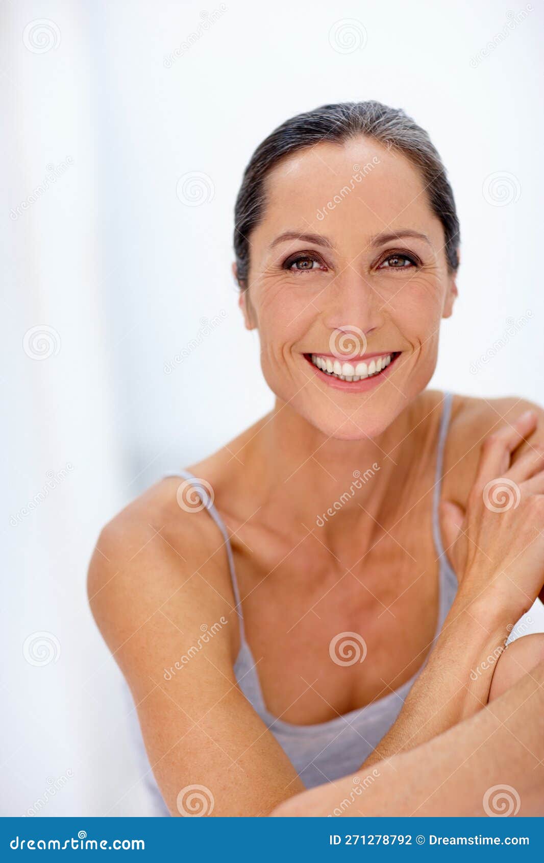 Happy And Healthy Cropped Portrait Of A Beautiful Mature Woman Posing