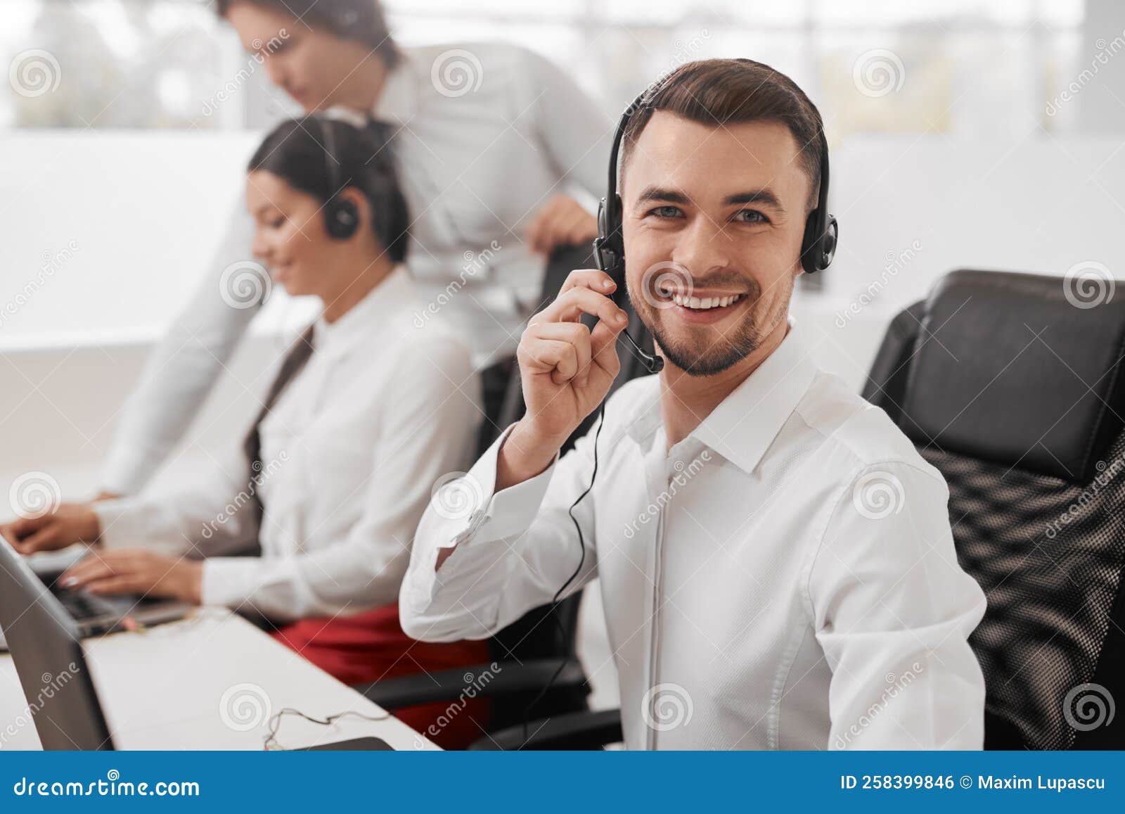 Happy Help Line Worker Looking at Camera Stock Photo - Image of ...