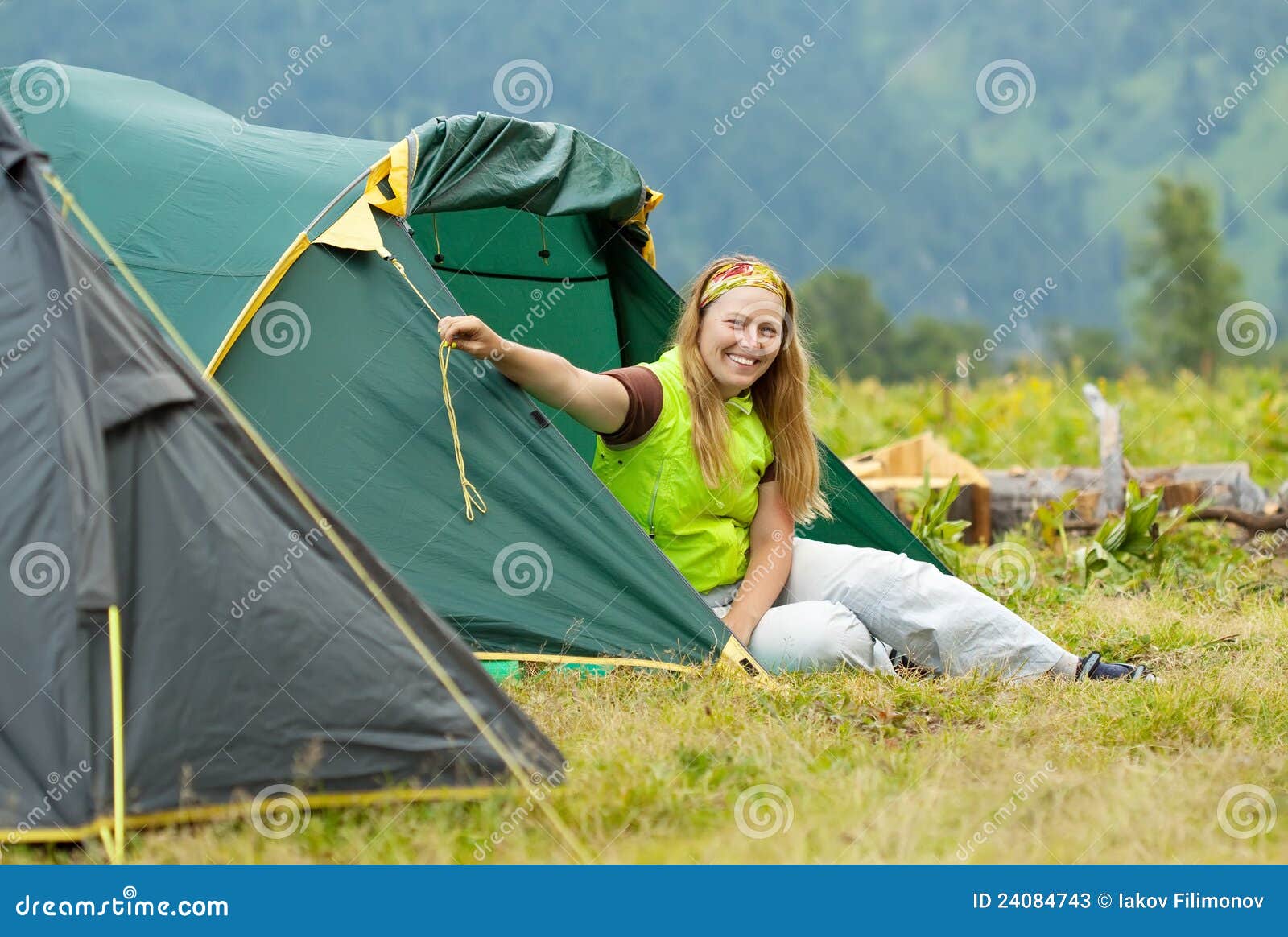 Happy hiker in camp tent stock image. Image of sitting - 24084743