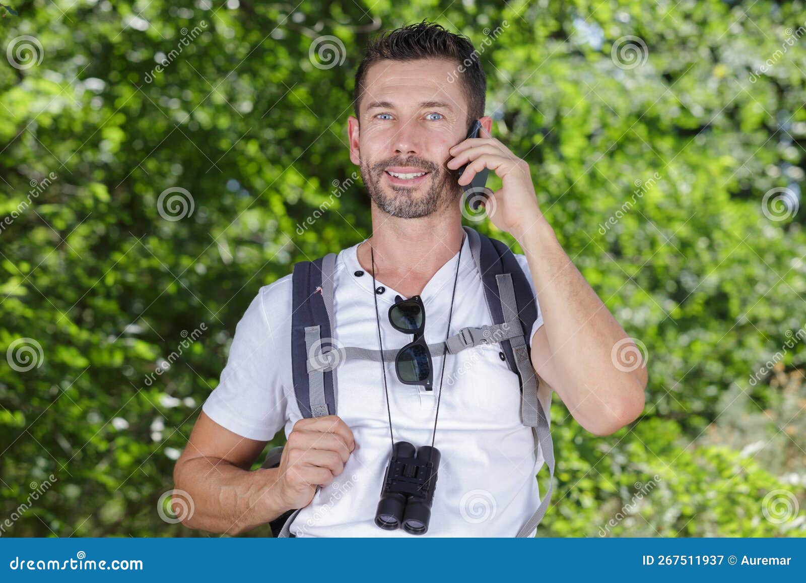 Happy Hiker Talking by Phone Outdoors while Having Trip Stock Image ...