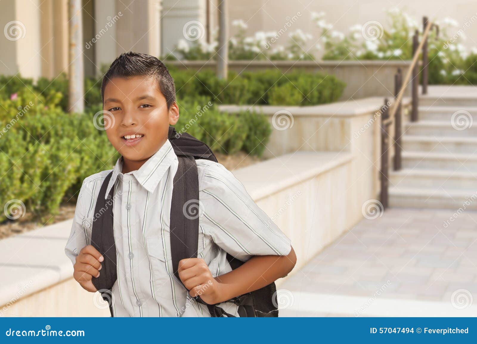 Happy Hispanic Boy with Backpack Walking on School Campus Stock Photo ...