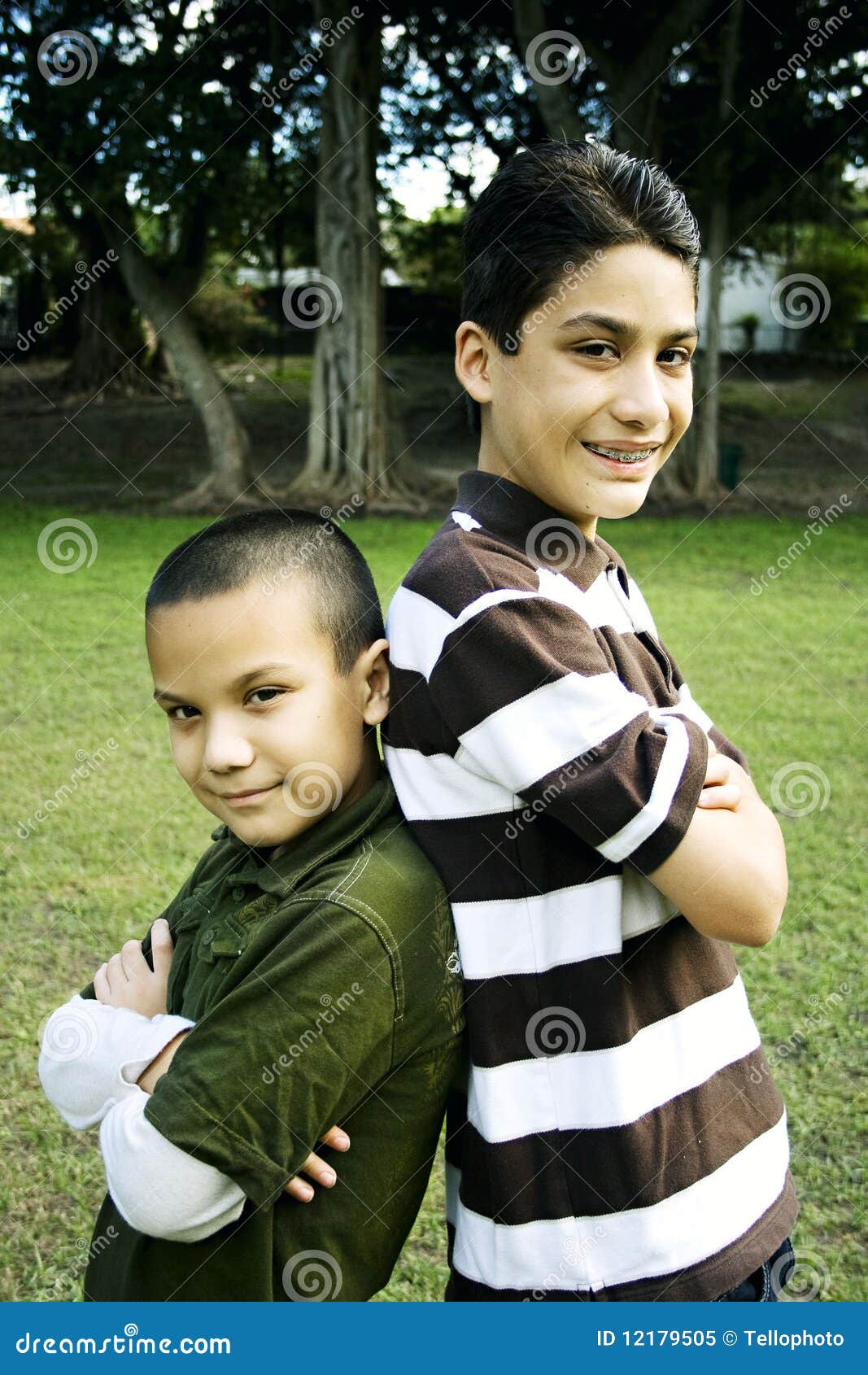 Happy Hispanic Brothers Together in Front of Tree Stock Image - Image ...