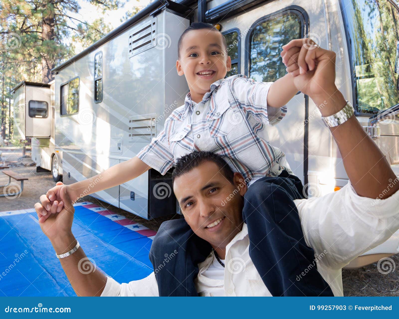 Happy Hispanic Father and Son in Front of Their Beautiful RV Stock ...