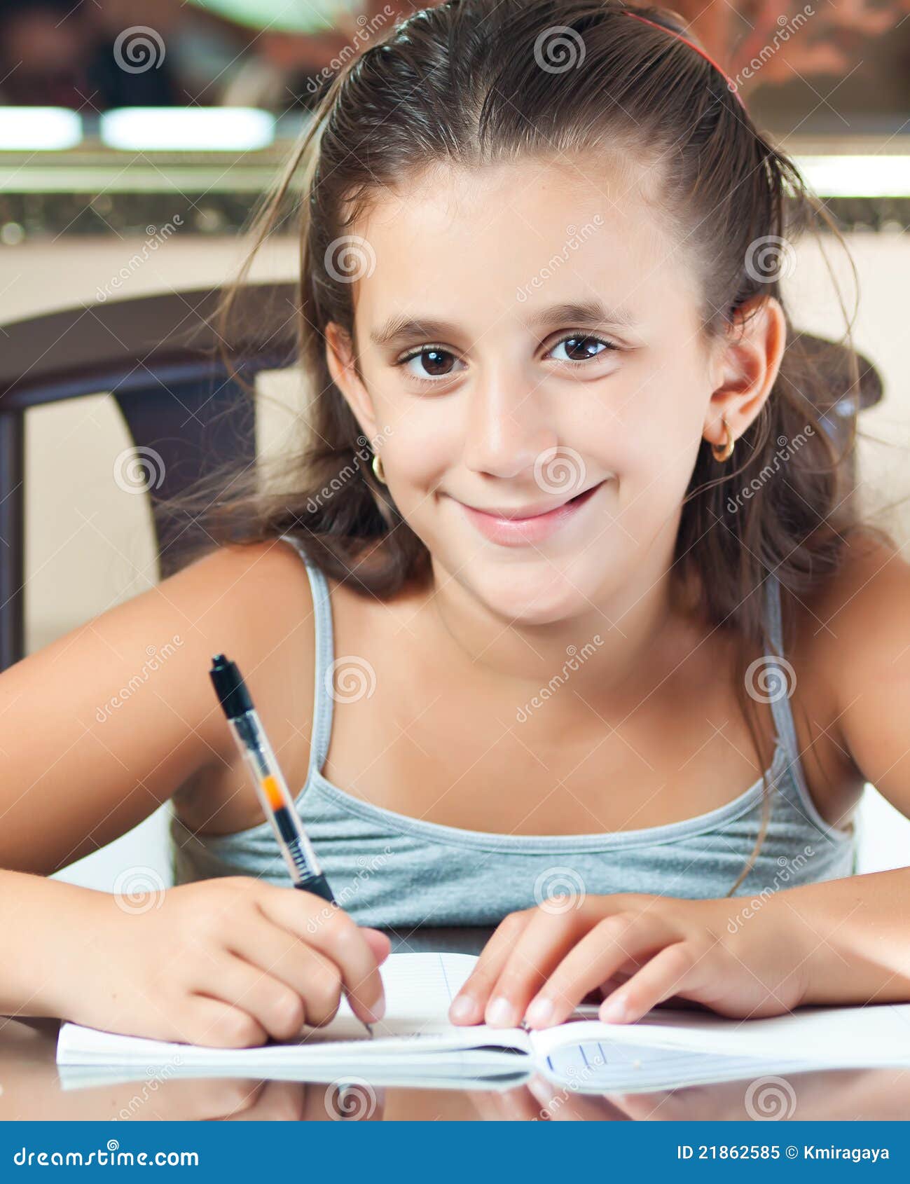 Happy Hispanic Girl Working on Her Homework Stock Image - Image of ...