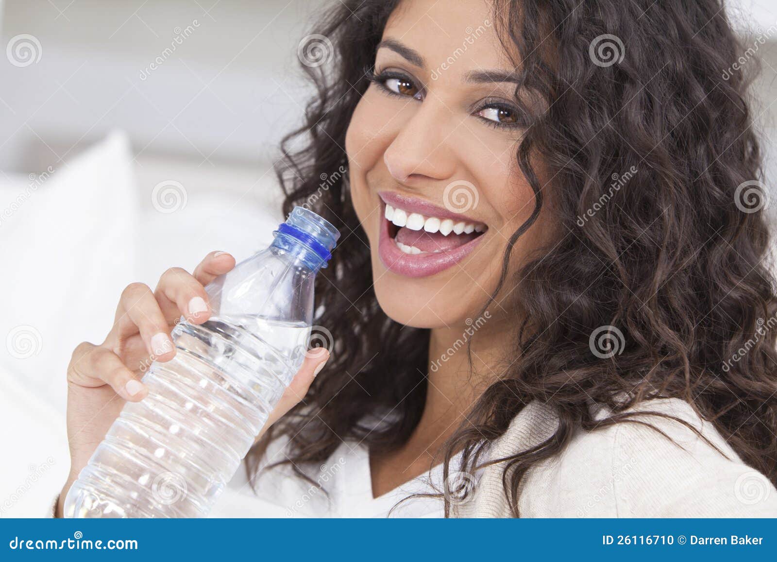 Happy Hispanic Woman Drinking Bottle of Water Stock Photo - Image of ...