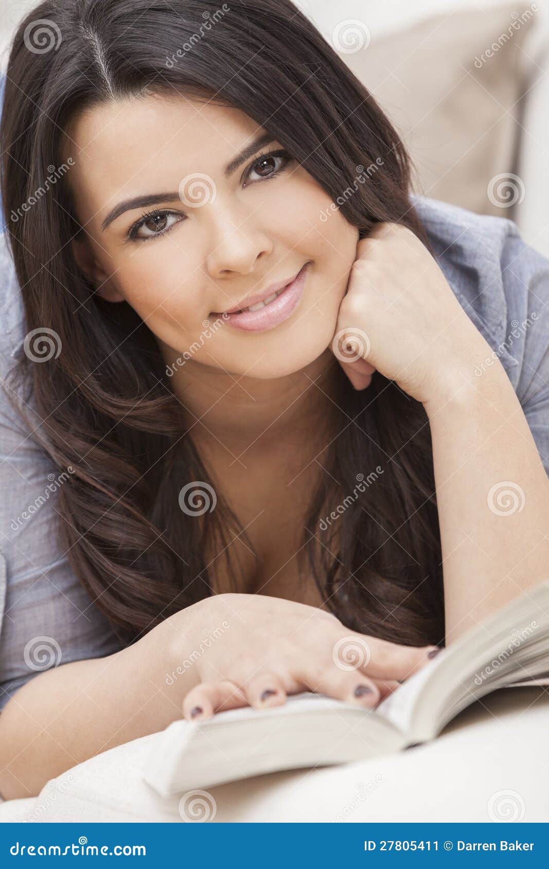 Happy Hispanic Woman Reading Paperback Book Stock Image - Image of ...