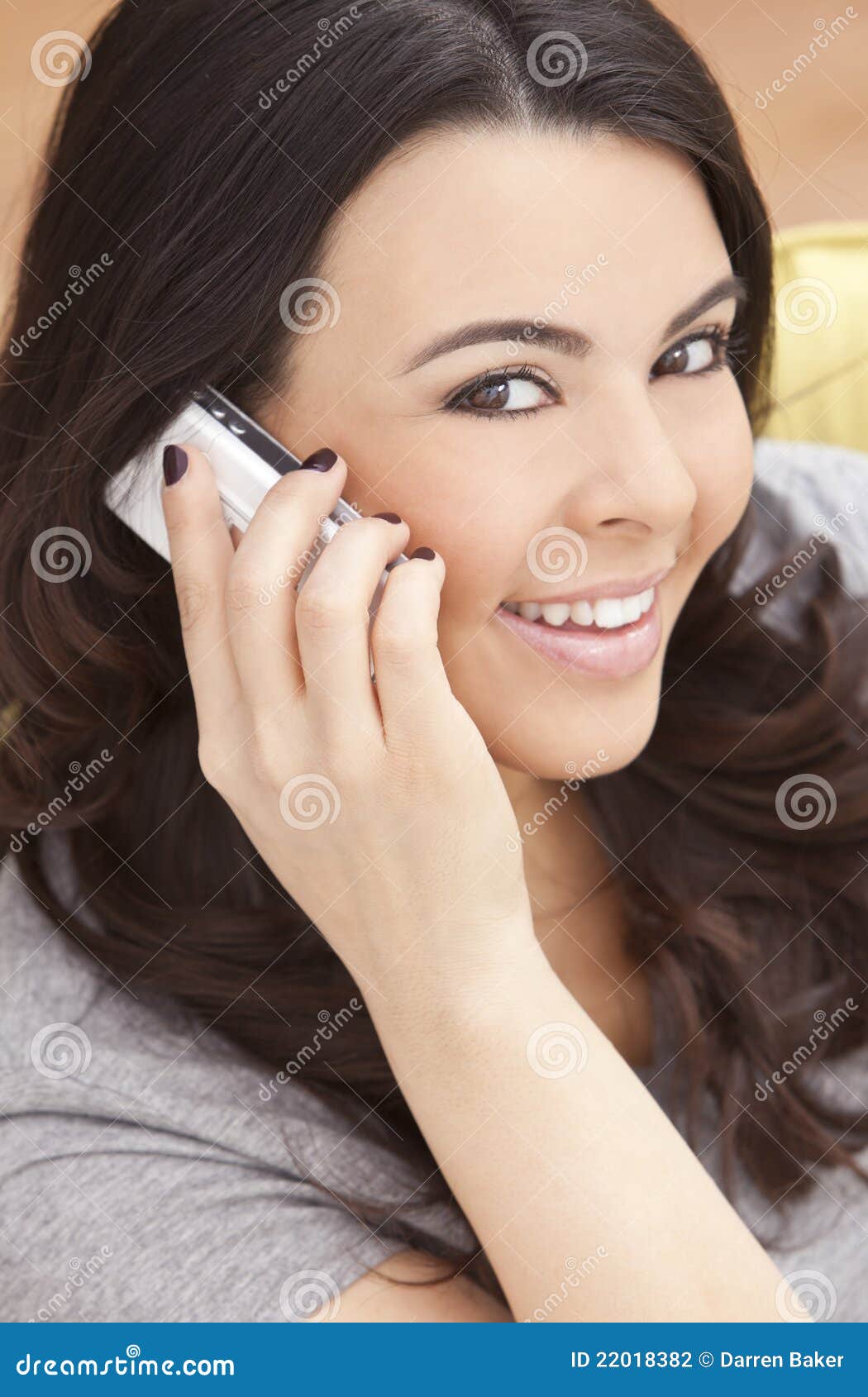 Happy Hispanic Woman Talking on Her Cell Phone Stock Photo - Image of ...