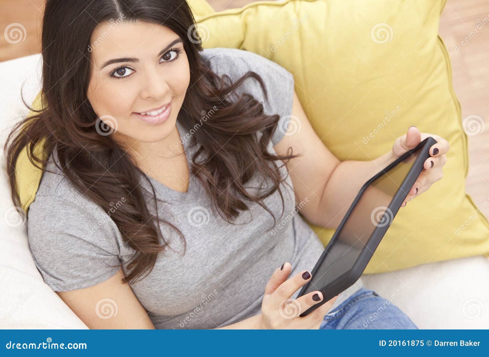 Happy Hispanic Woman Using Tablet Computer at Home Stock Image - Image ...