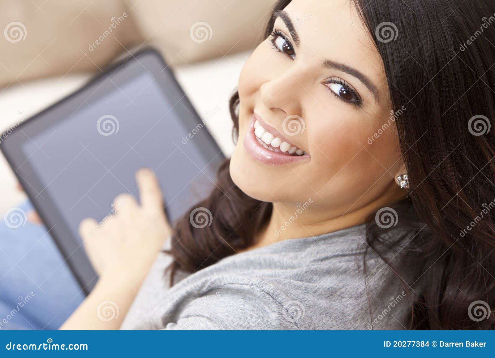 Happy Hispanic Woman Using Tablet Computer or IPad Stock Photo - Image ...