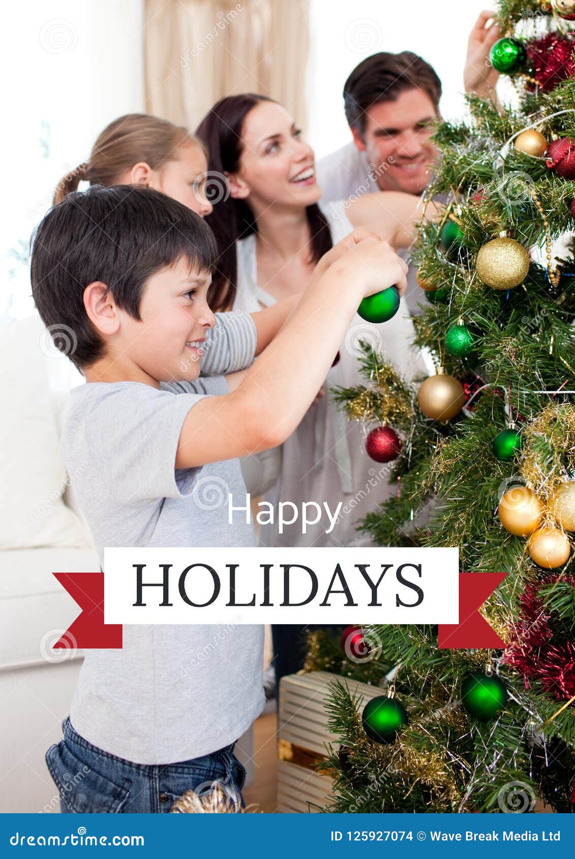 Happy Holidays Text with Family Decorating Tree Stock Photo - Image of ...