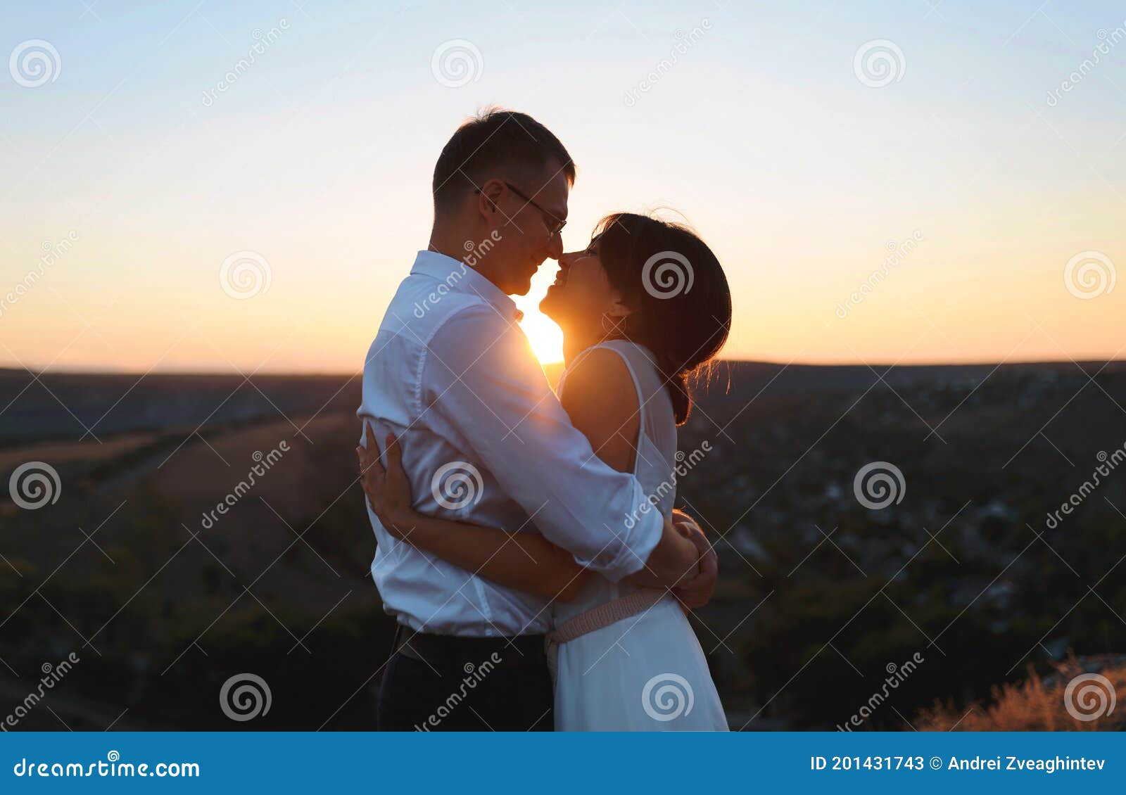 Happy Hugging Couple at Sunset Stock Image - Image of outdoor ...