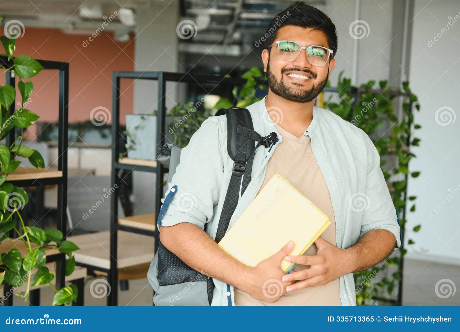 Happy Indian Male Student at the University Stock Image - Image of book ...