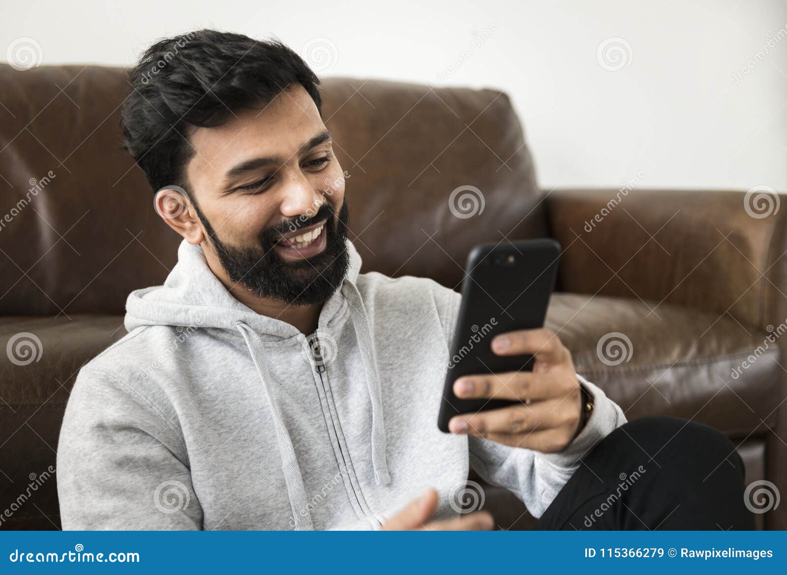 Happy Indian Man Using Mobile Phone Stock Image - Image of hand ...