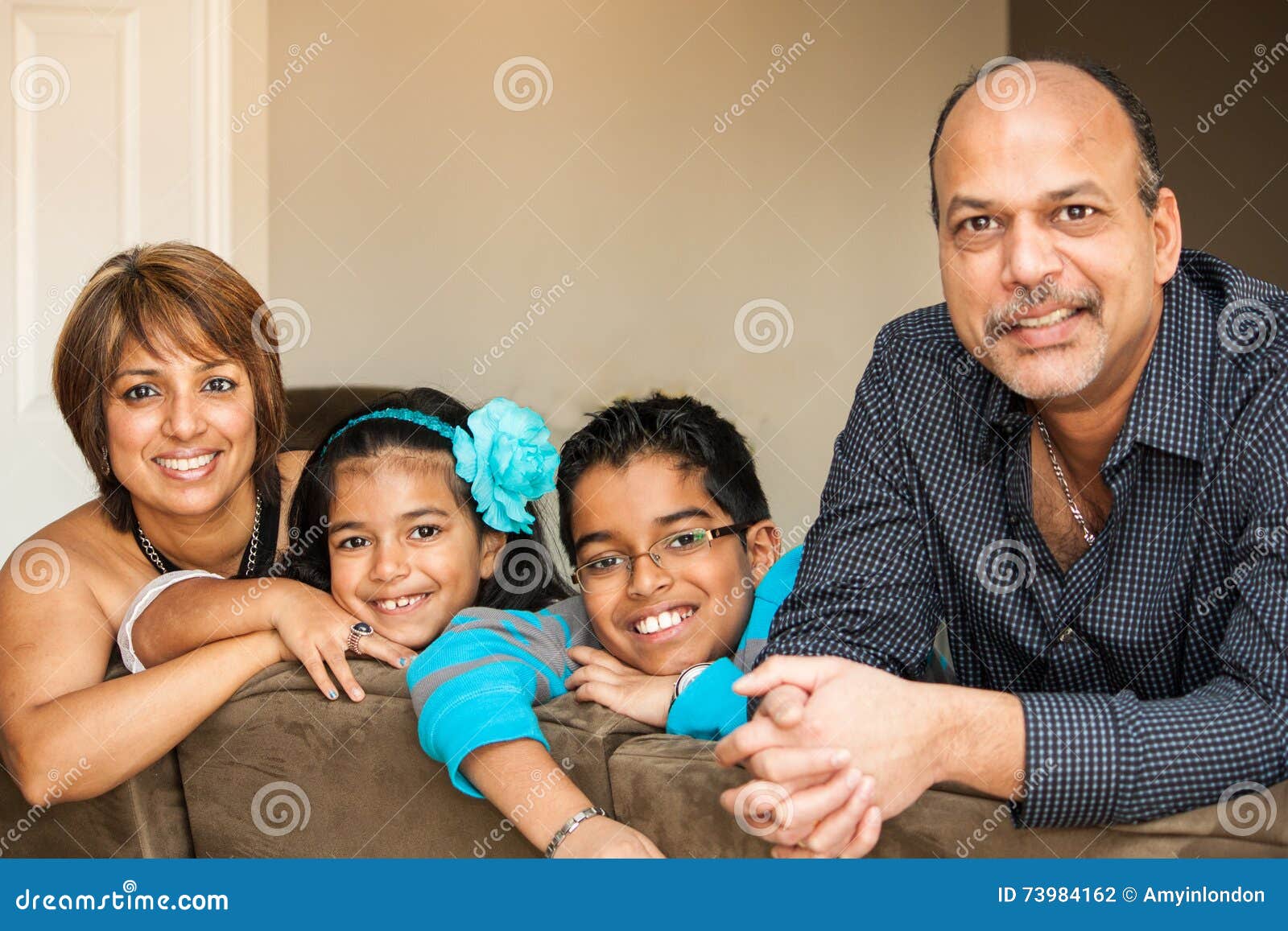 Happy Indian Origin Family at Home Stock Photo - Image of group ...