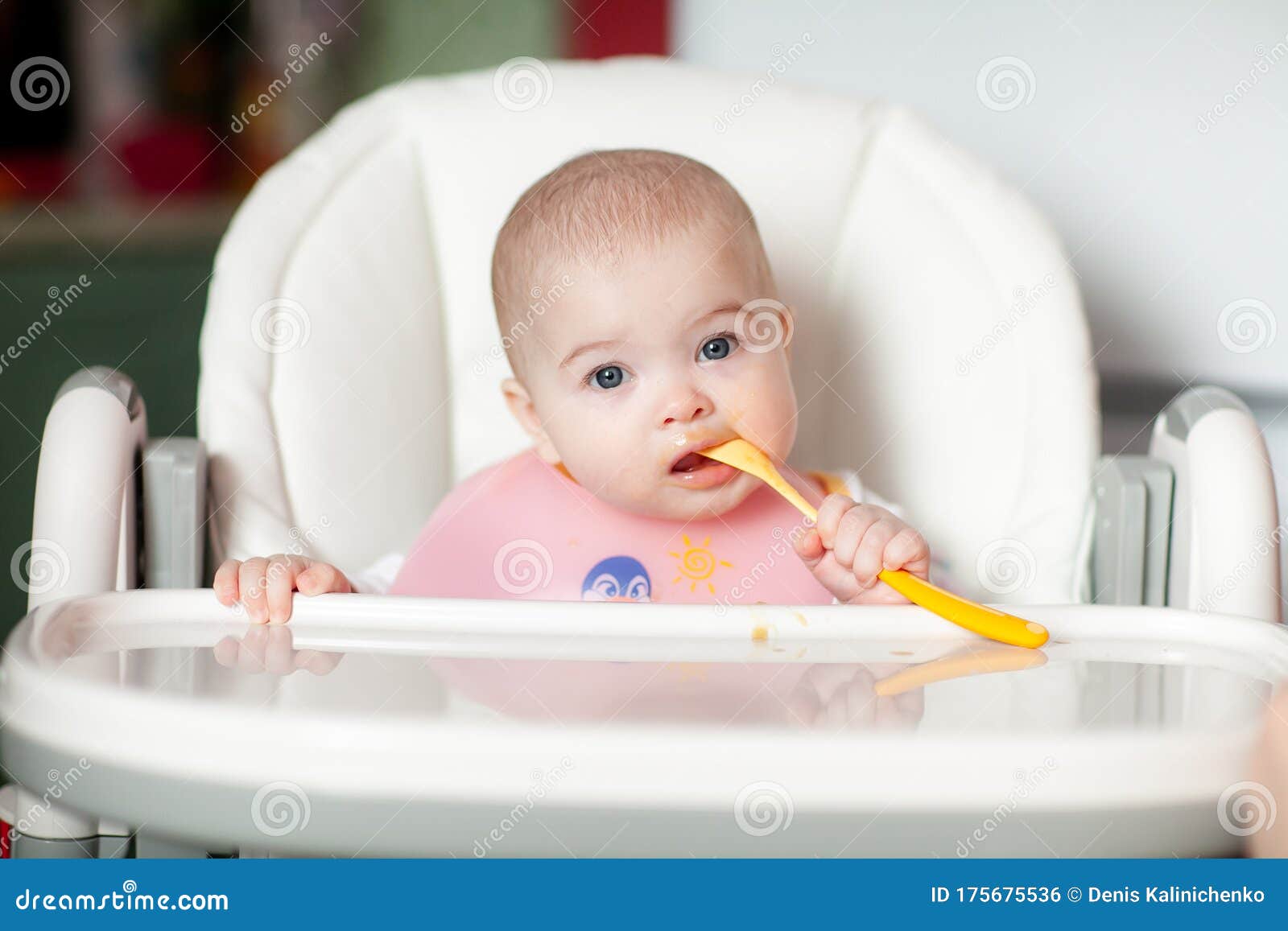 Happy Infant Baby Spoon Eats Itself. Beautiful Baby Eating Mashed Stock ...