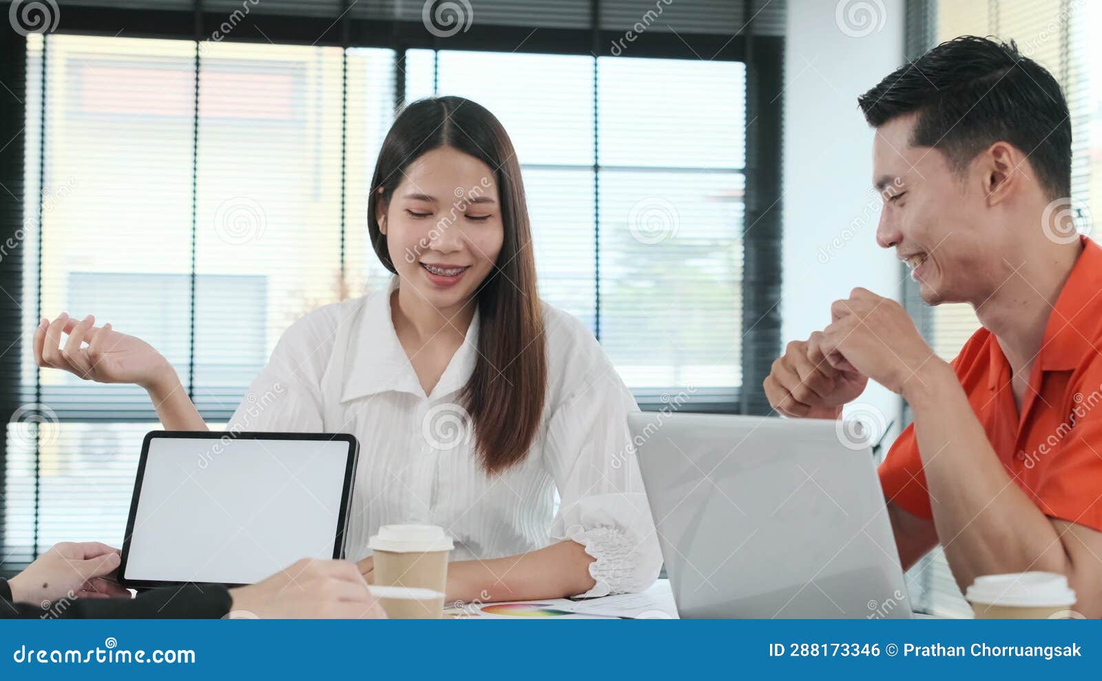 Happy Interior Designer Team Collaborating on New Project, Selecting ...