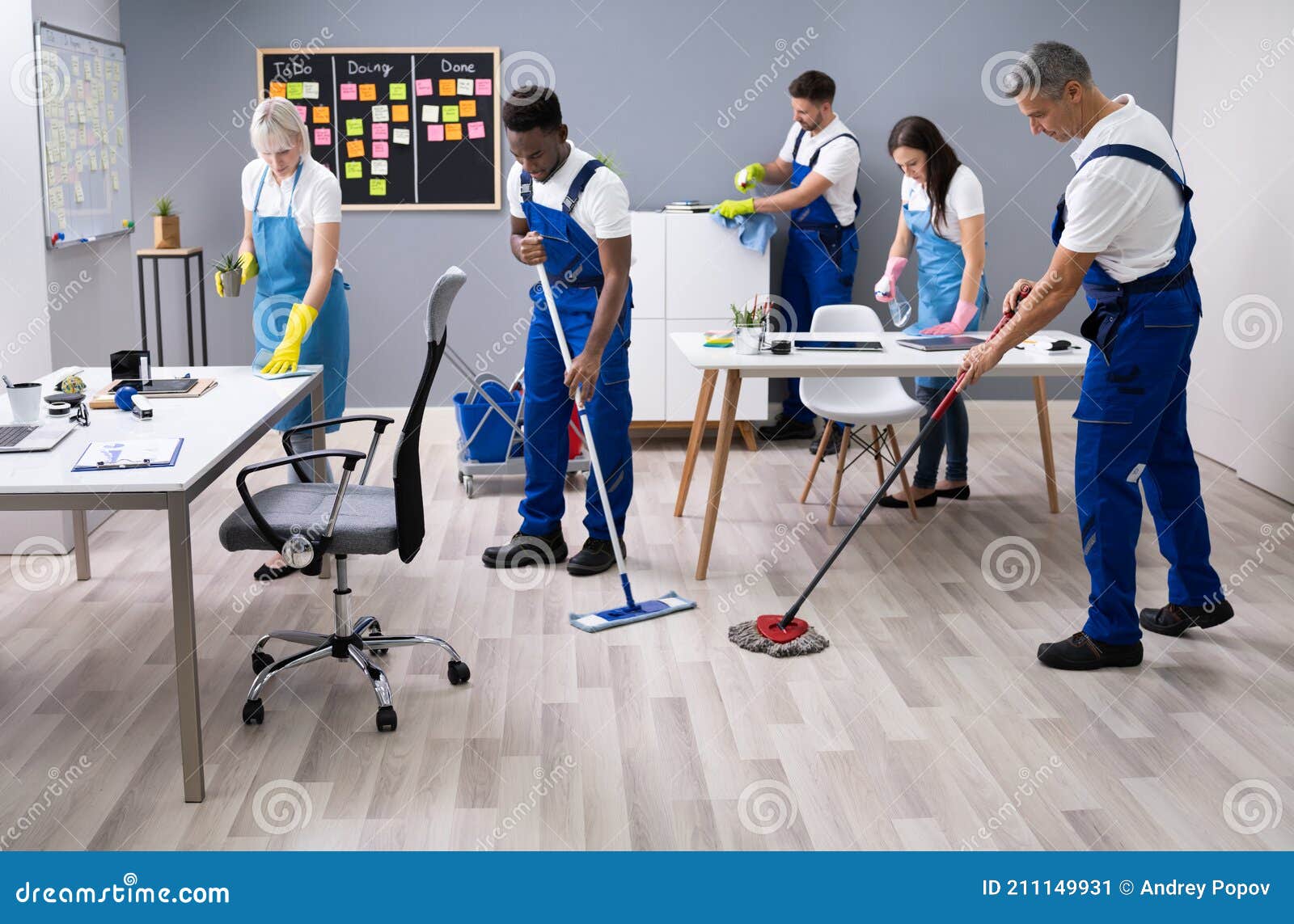Happy Janitors Cleaning Office Stock Image - Image of person ...