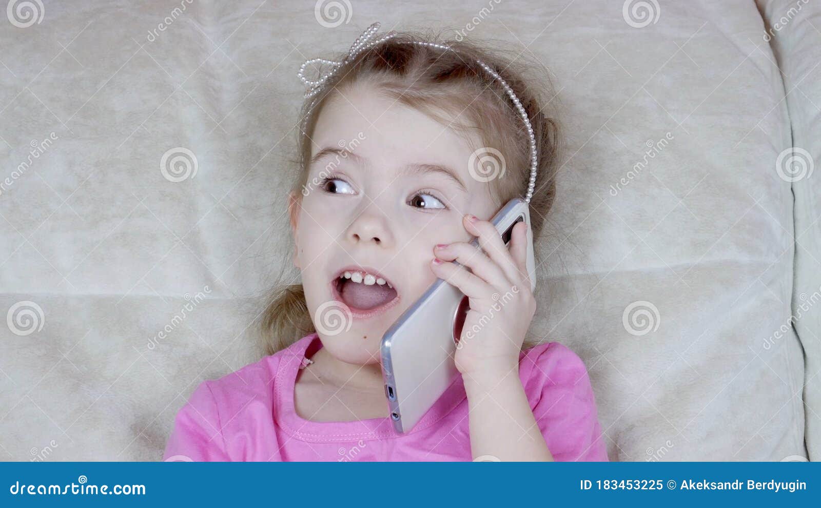 Happy Joyful Smiling Child is Speaking on the Phone Stock Image - Image ...