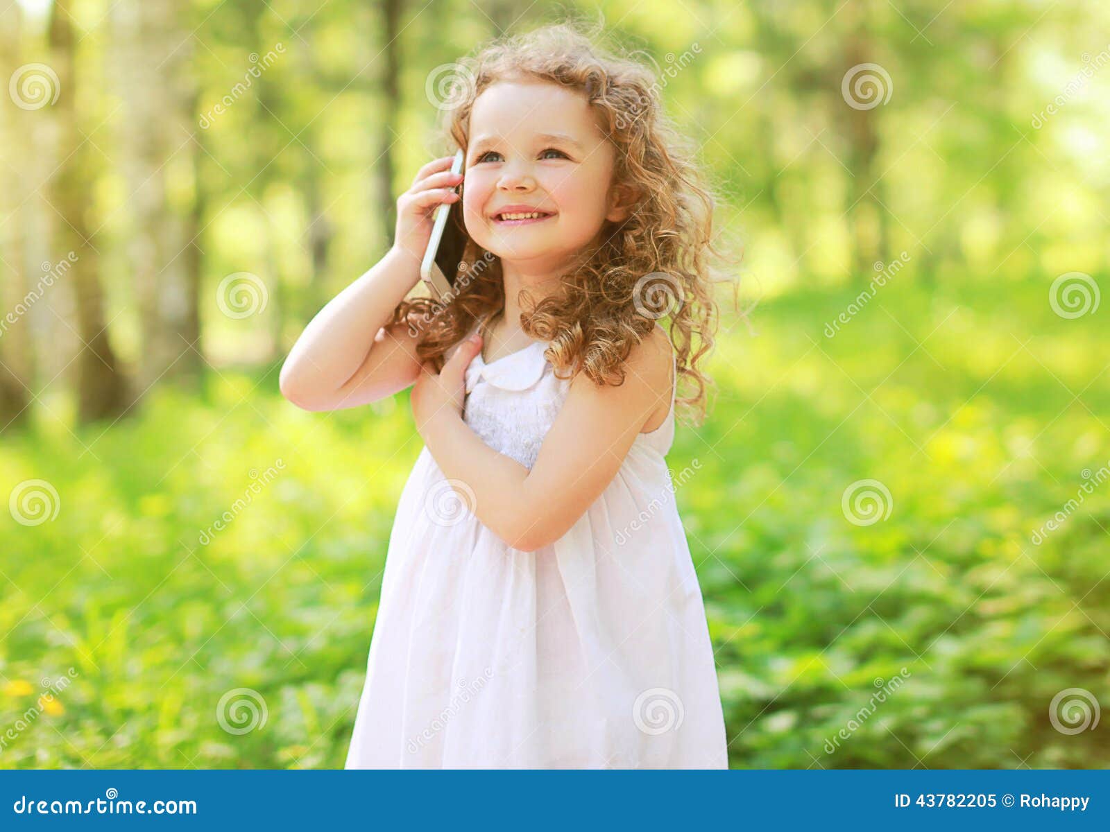 Happy Joyful Smiling Child is Speaking on the Phone Stock Image - Image ...