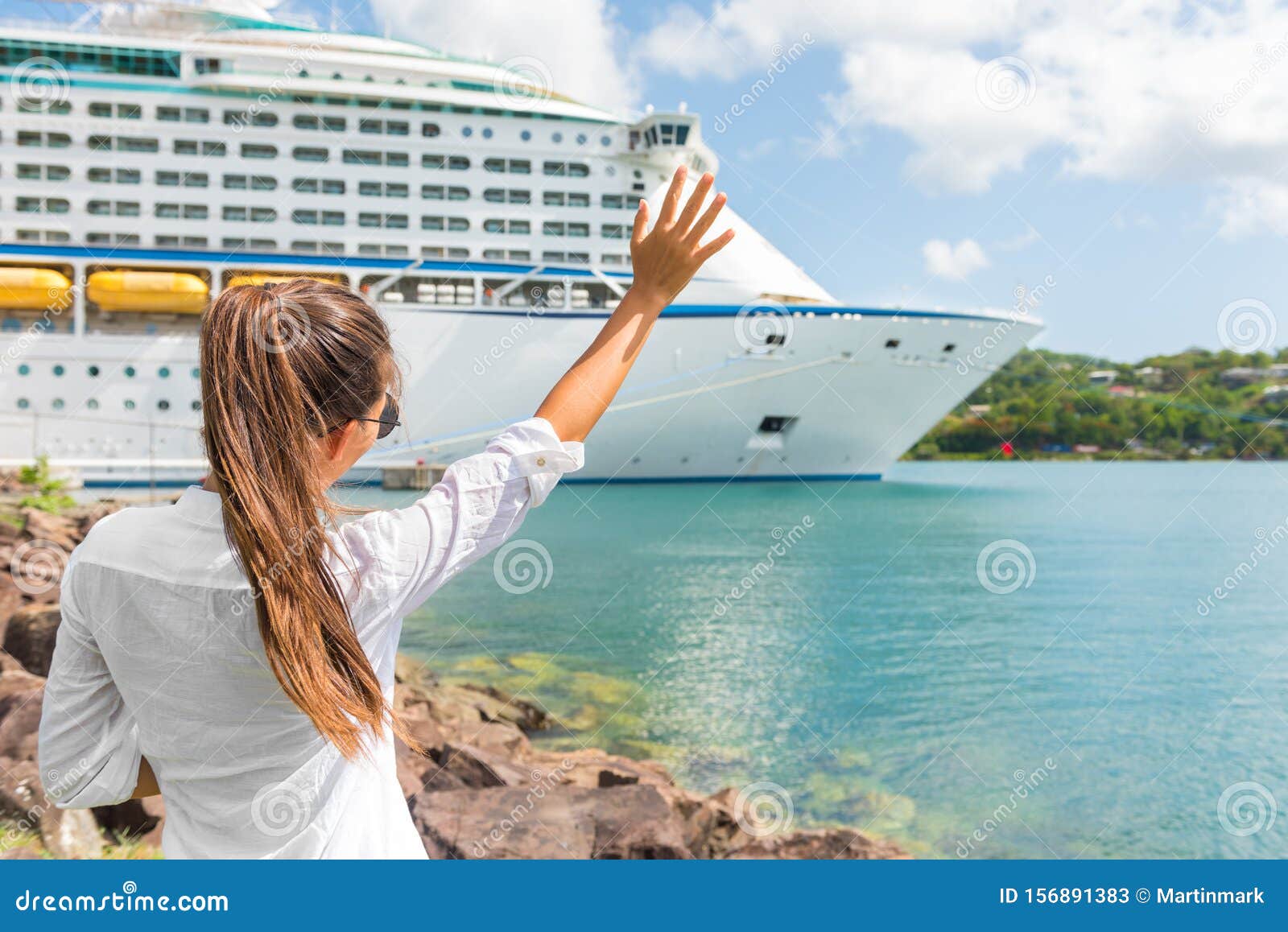 Happy Joyful Woman Waving Hello Or Goodbye Hand Sign To Cruise Ship
