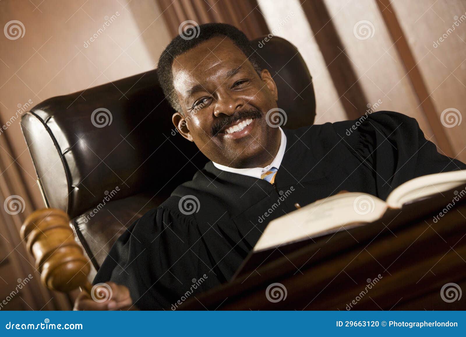 Happy Judge Holding Gavel stock photo. Image of courtroom - 29663120