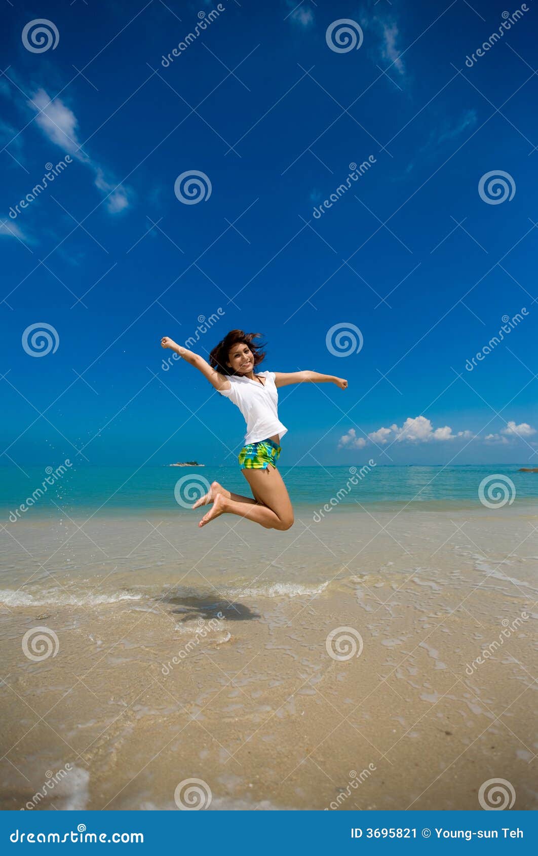 Happy jump at the beach stock image. Image of healthy - 3695821