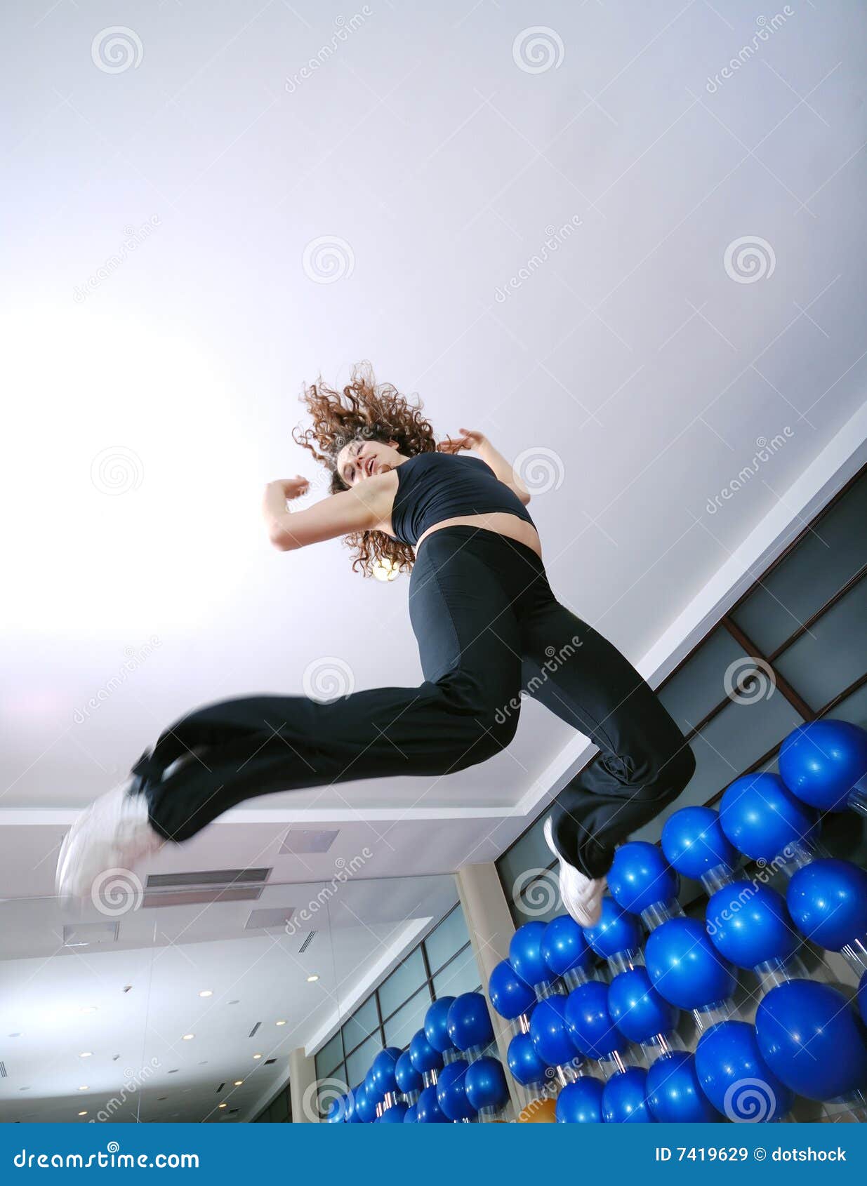 Happy and jumping up. stock image. Image of indoor, motion - 7419629