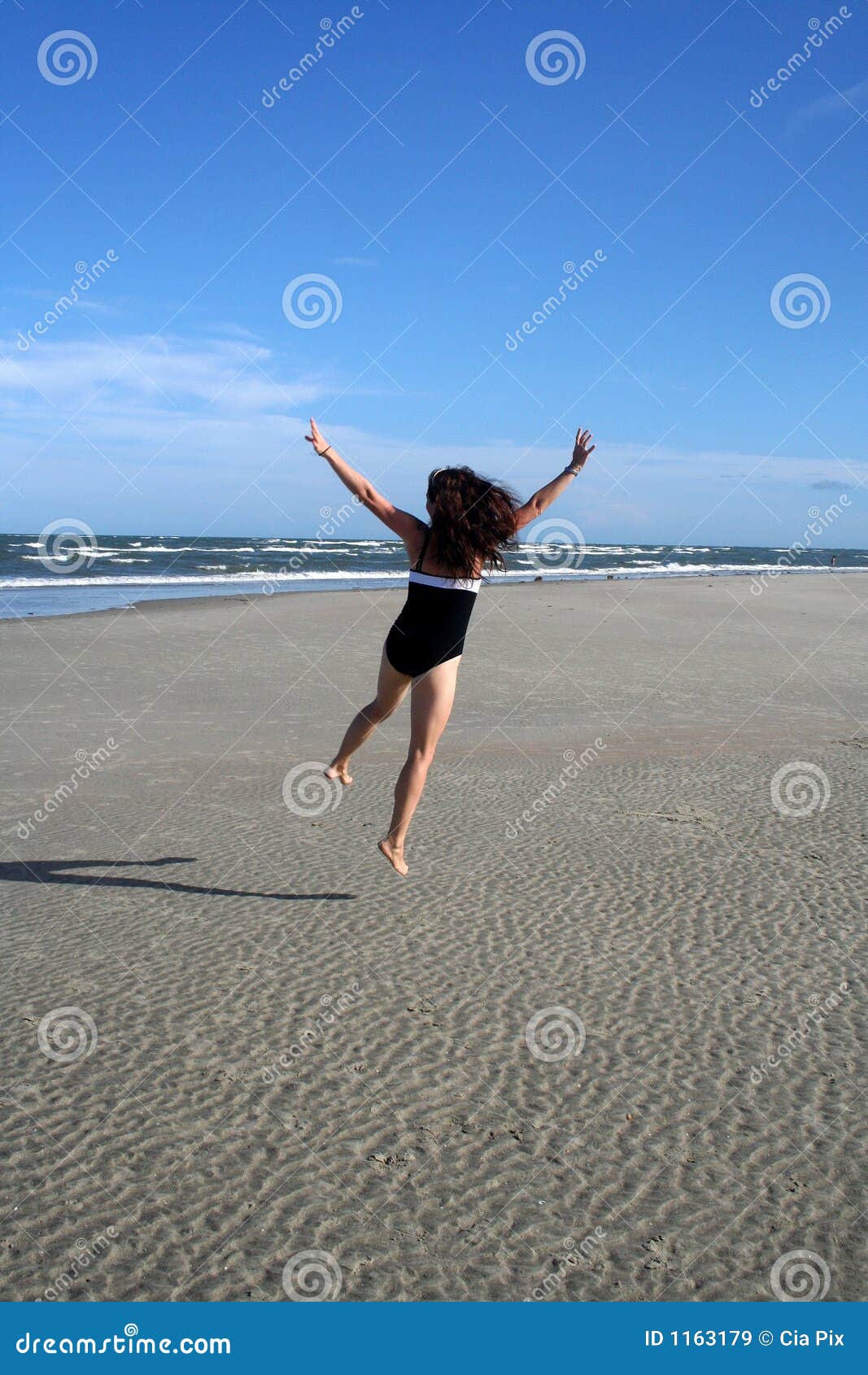 Happy jumping woman stock image. Image of freedom, alternative - 1163179