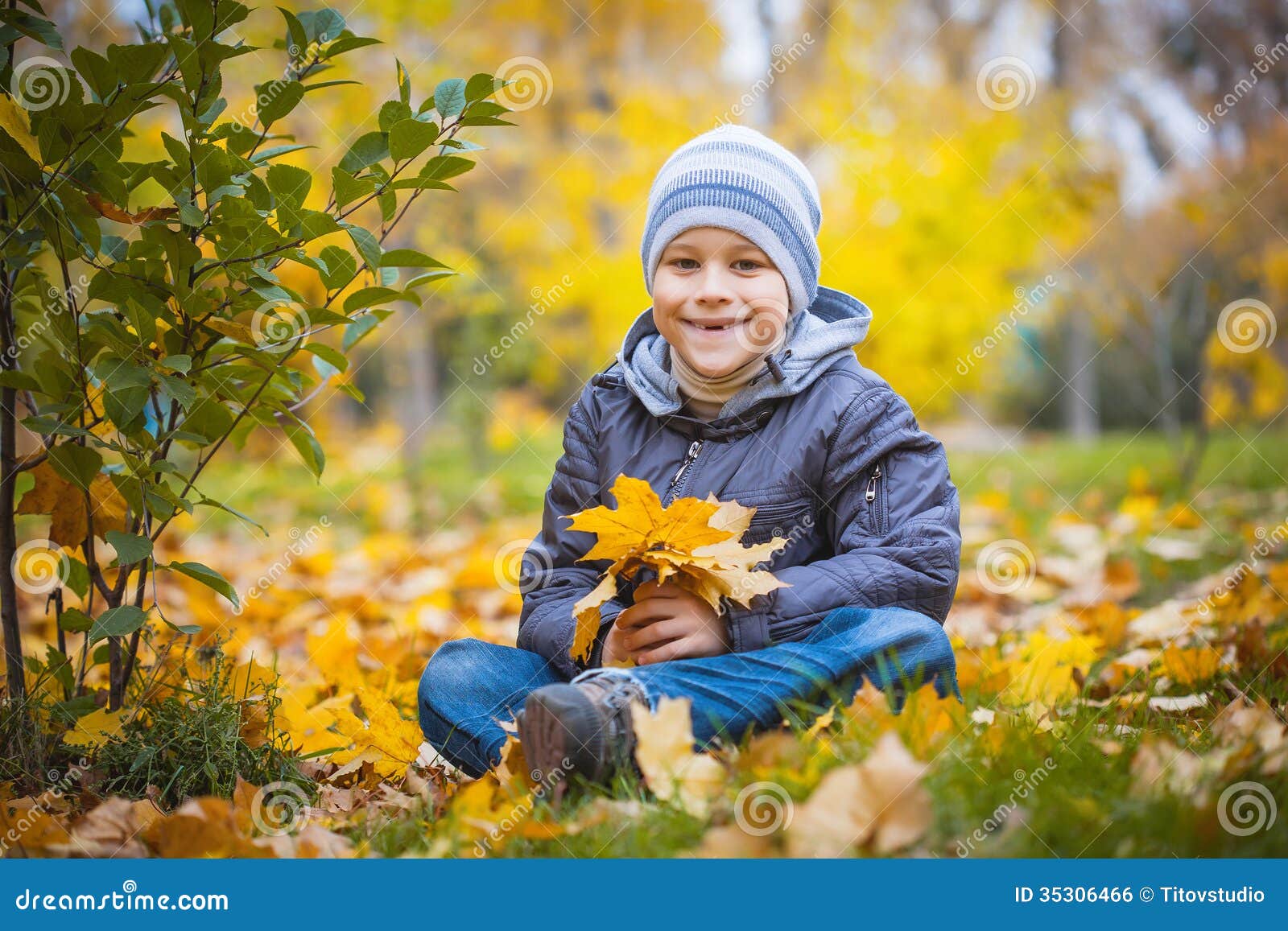Happy Kid on a Background of Autumn Leafs Stock Photo - Image of ...