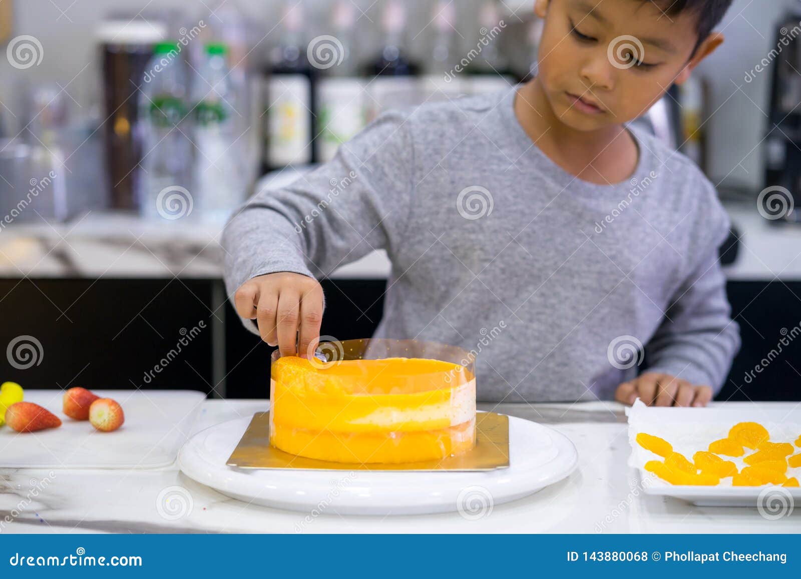 Happy Kid Boy Making a Cake Stock Photo - Image of sweet, childhood ...